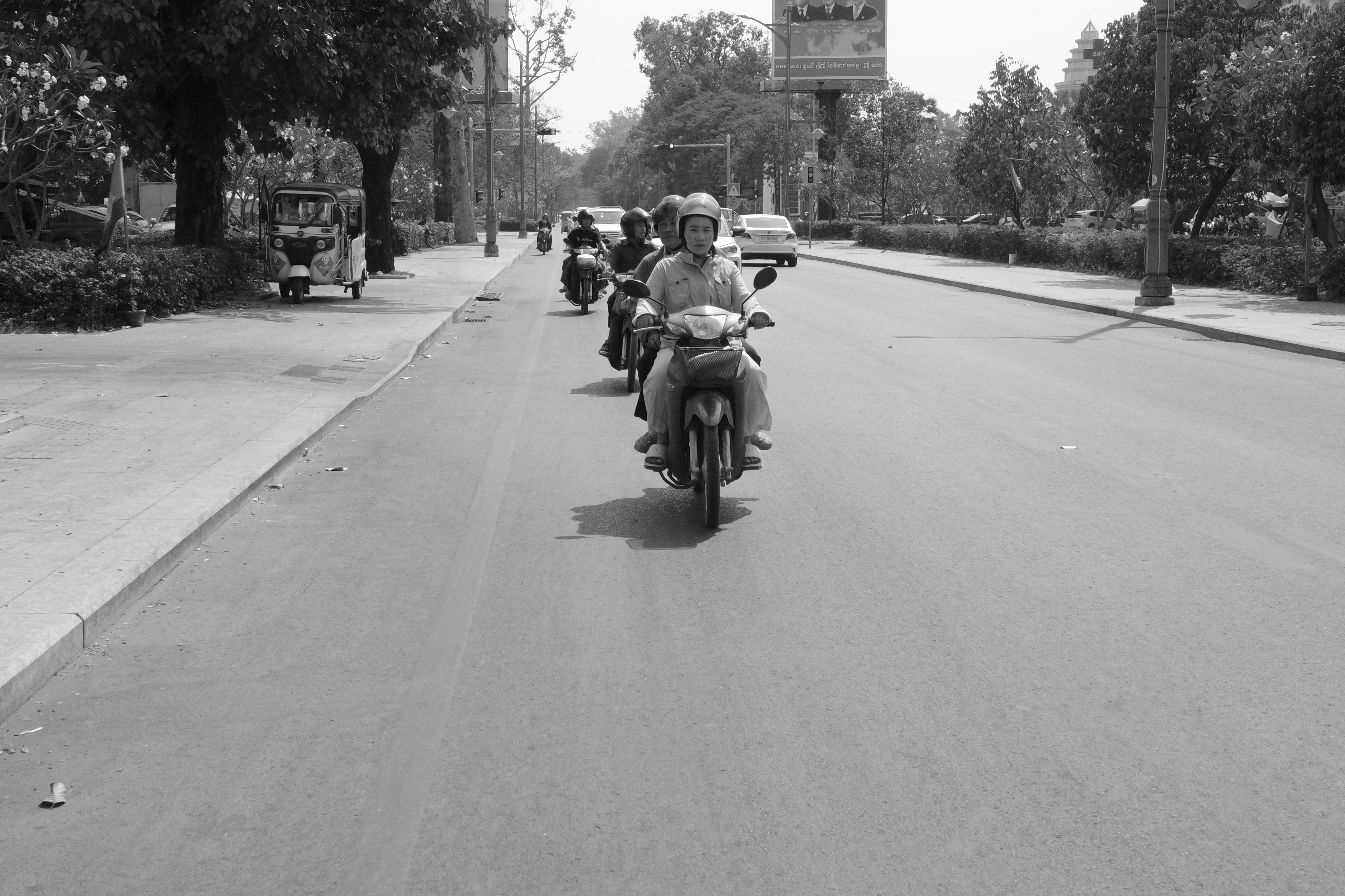 Rider Queue: Central Figure Leads a Quiet City Ride