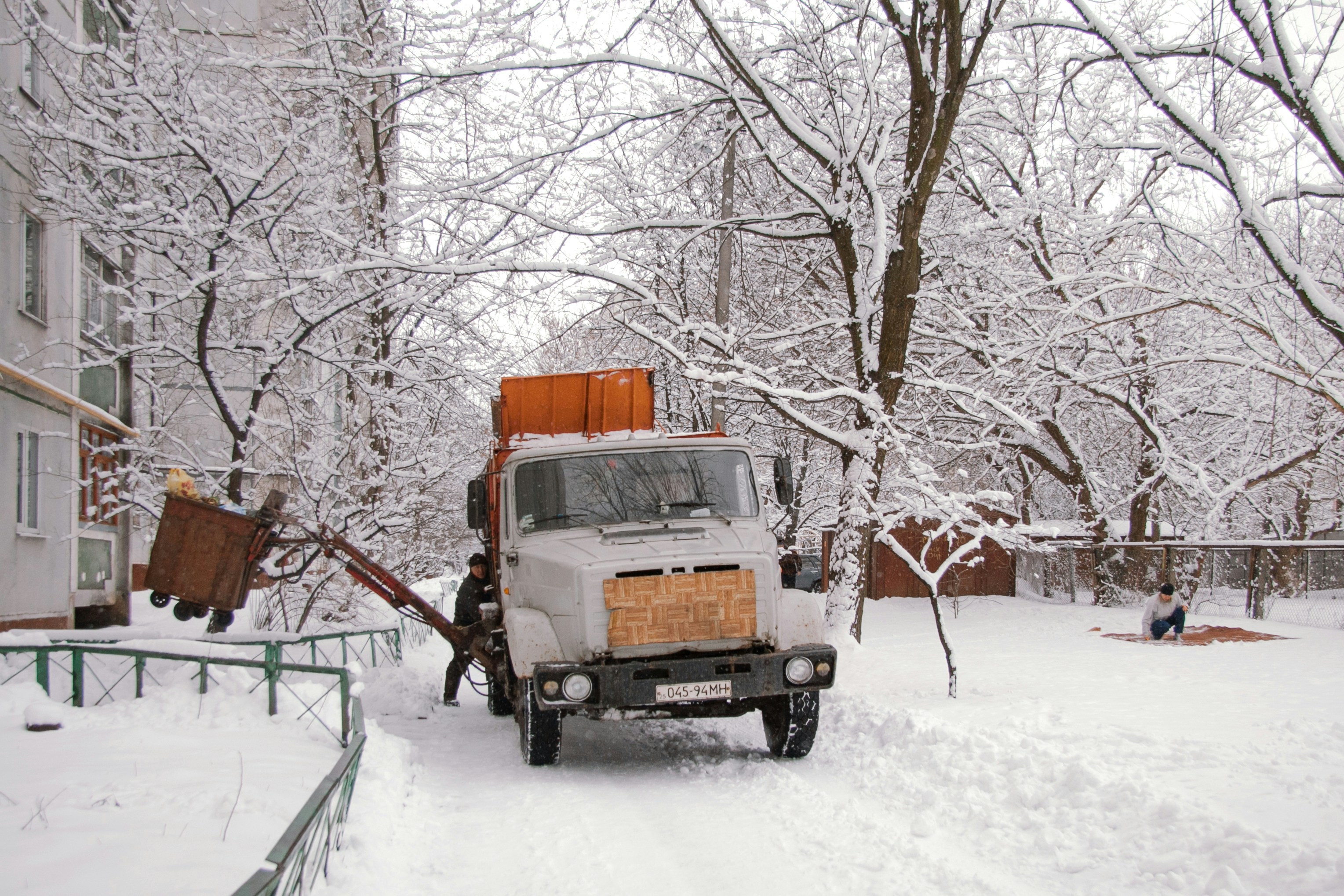 Snowbound Truck Yard: A Quiet Winter Standoff