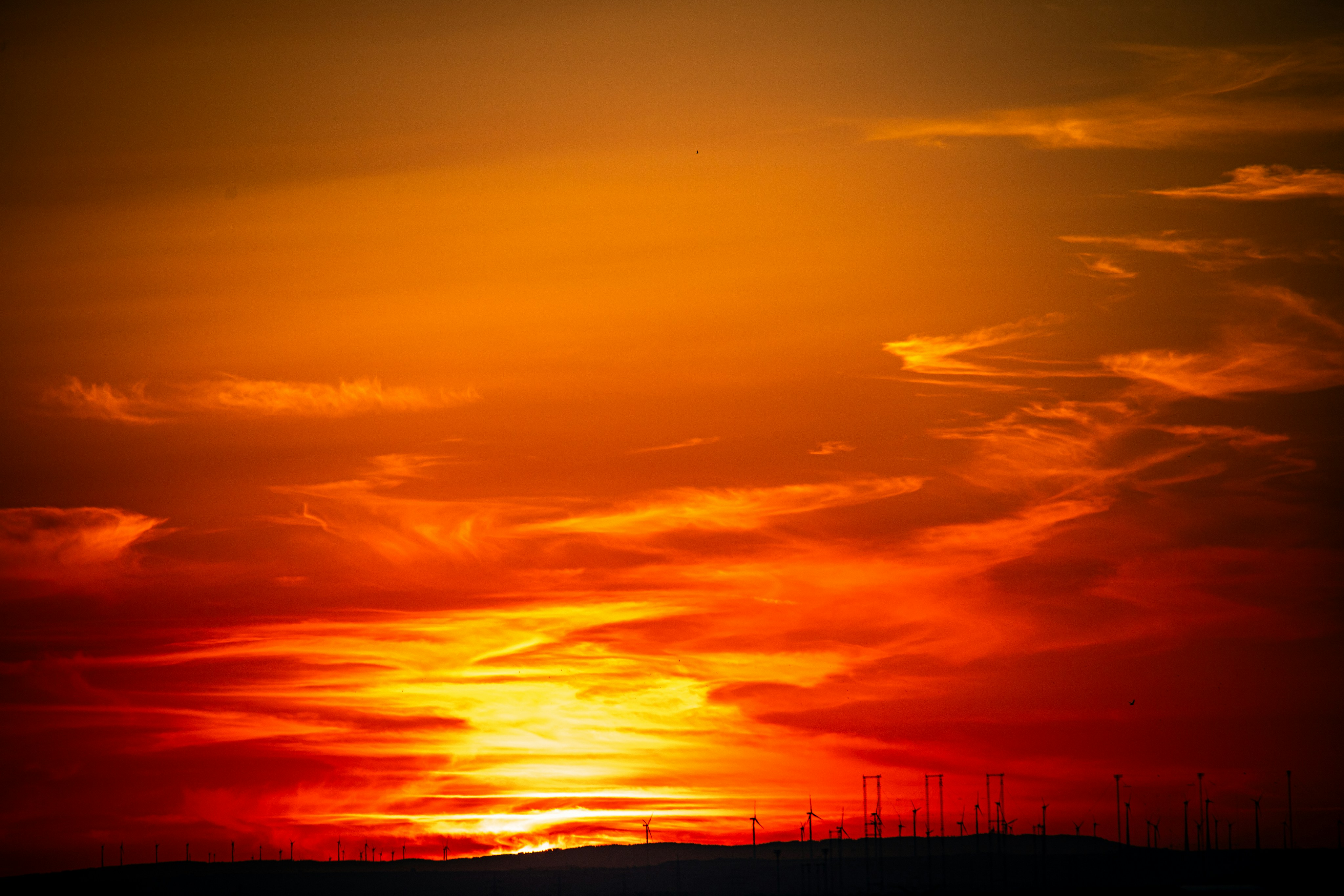 Crimson Horizon: Sunset Over a Quiet Ridge