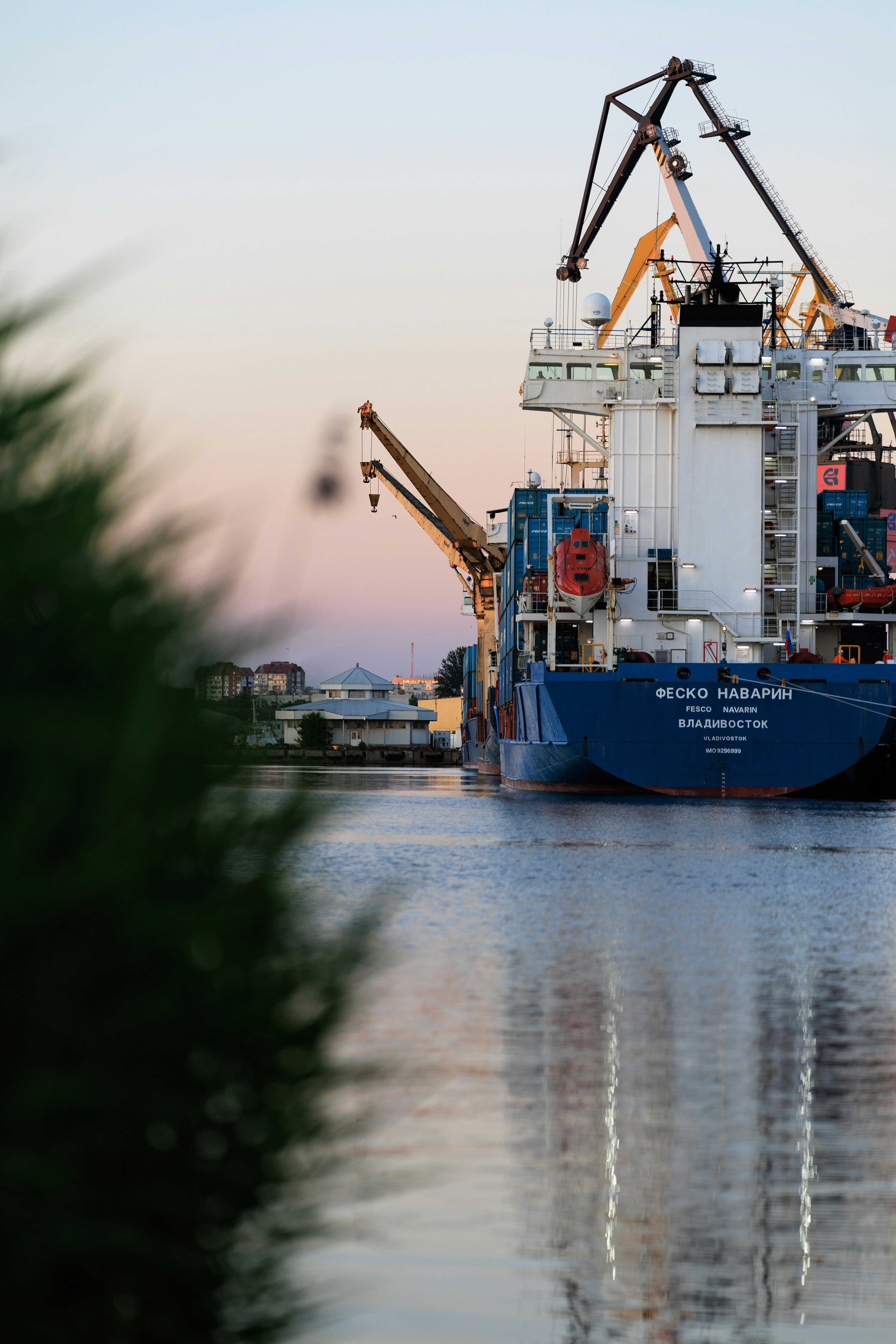 Harbor Crane Ballet at Dusk