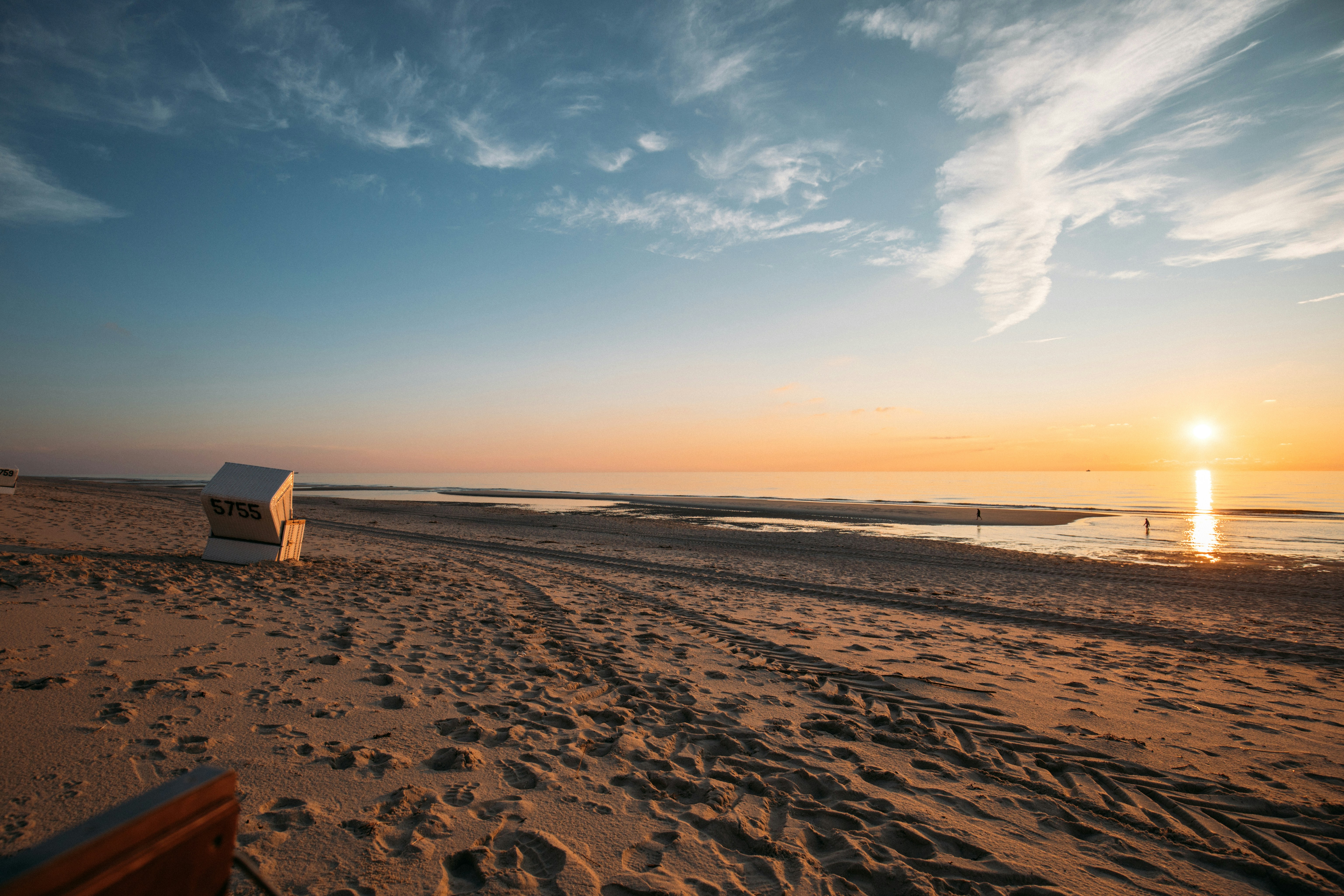 Duneline at Dusk: A Quiet Beach Scene with a Seaside Cabin