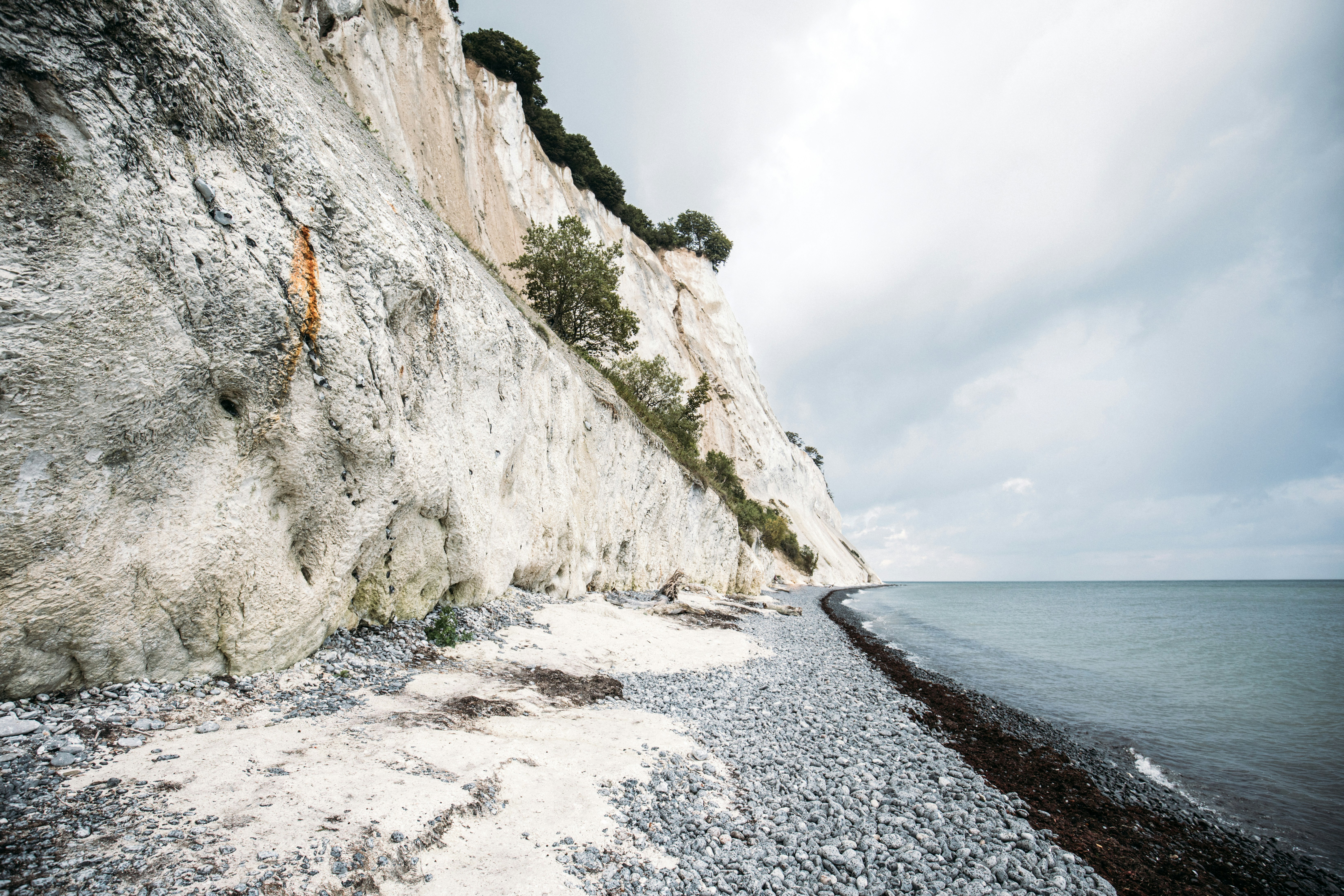 Cliffside shoreline under a brooding sky
