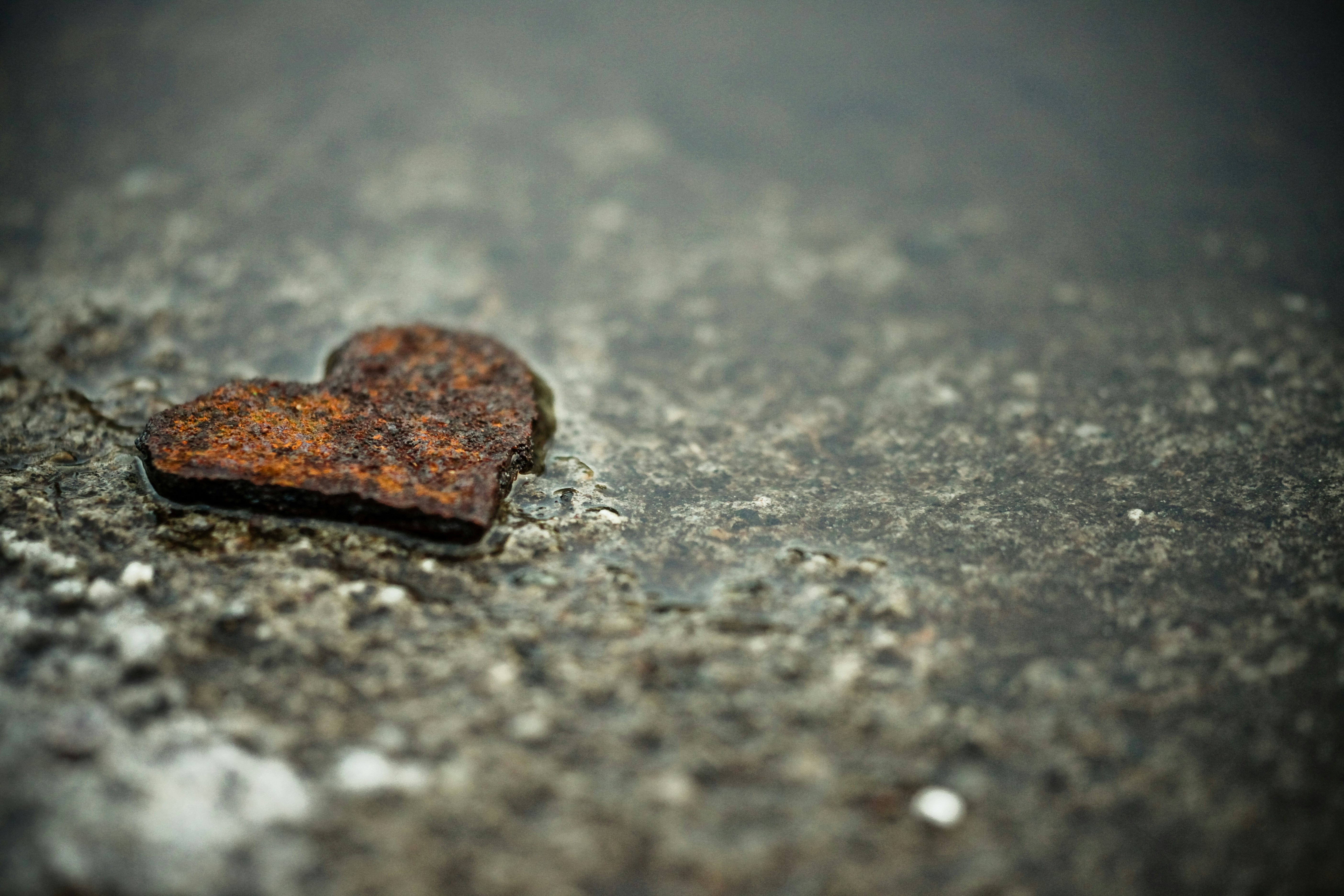Rusty Heart on Weathered Concrete