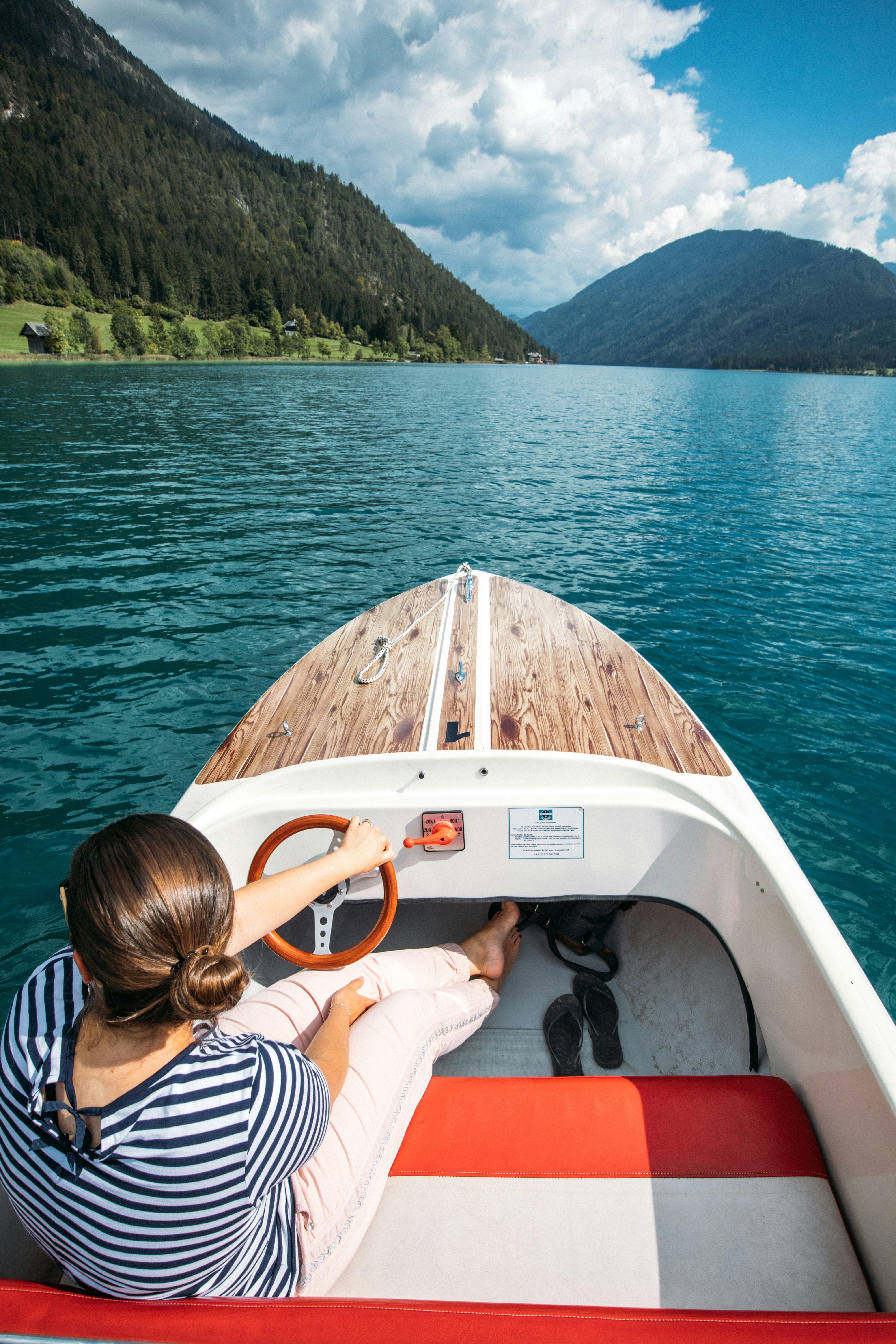 Steering Toward the Blue Fjord: A Quiet Boat Ride