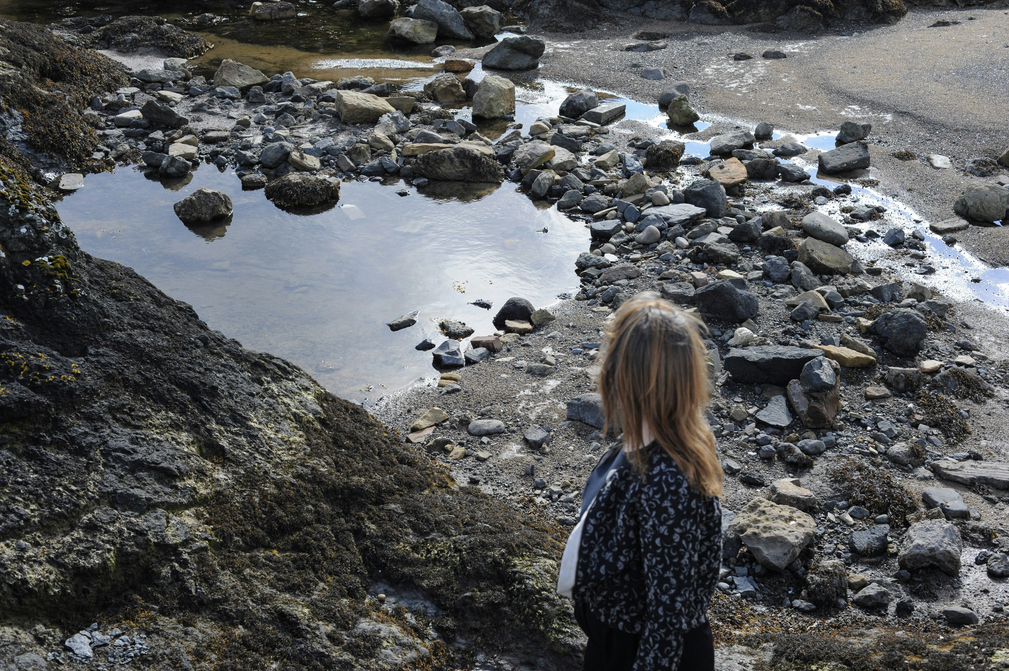 Child at the Edge of Tide and Stone