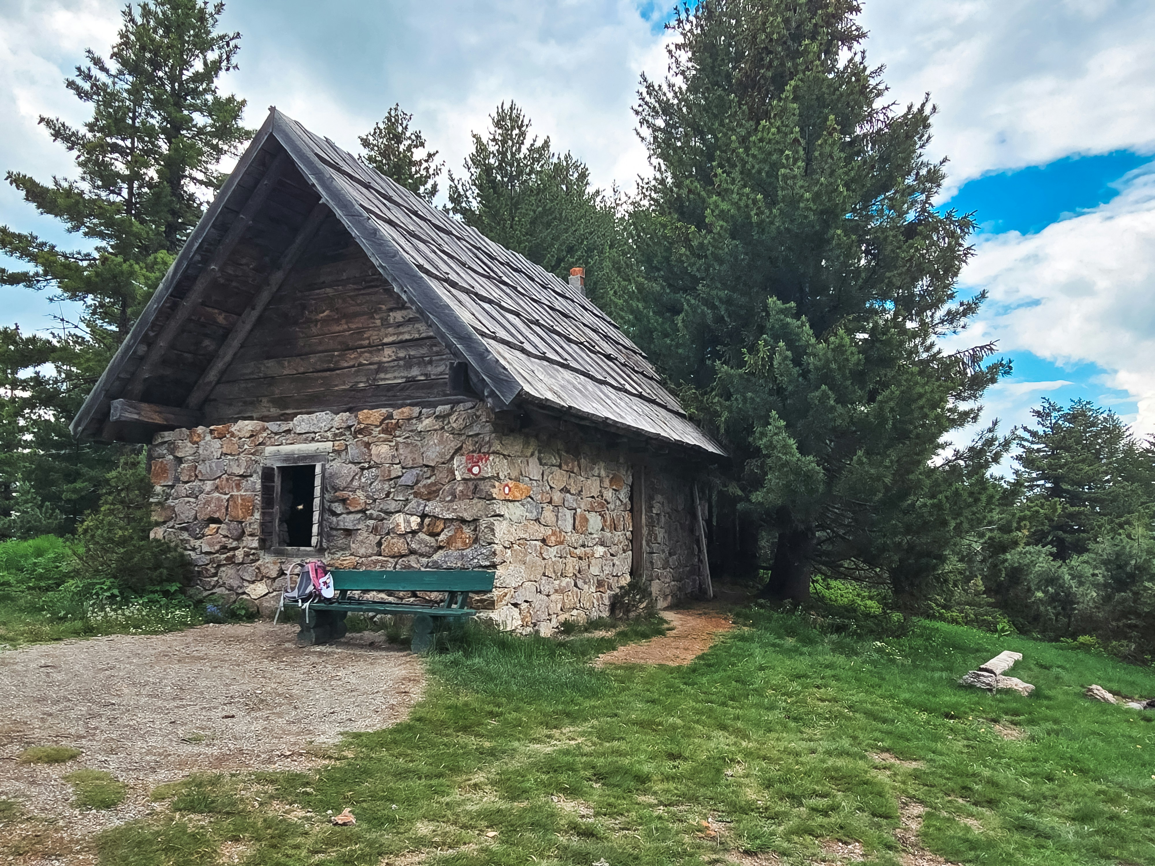 Stone Cabin by the Pines in Mountain Clearing