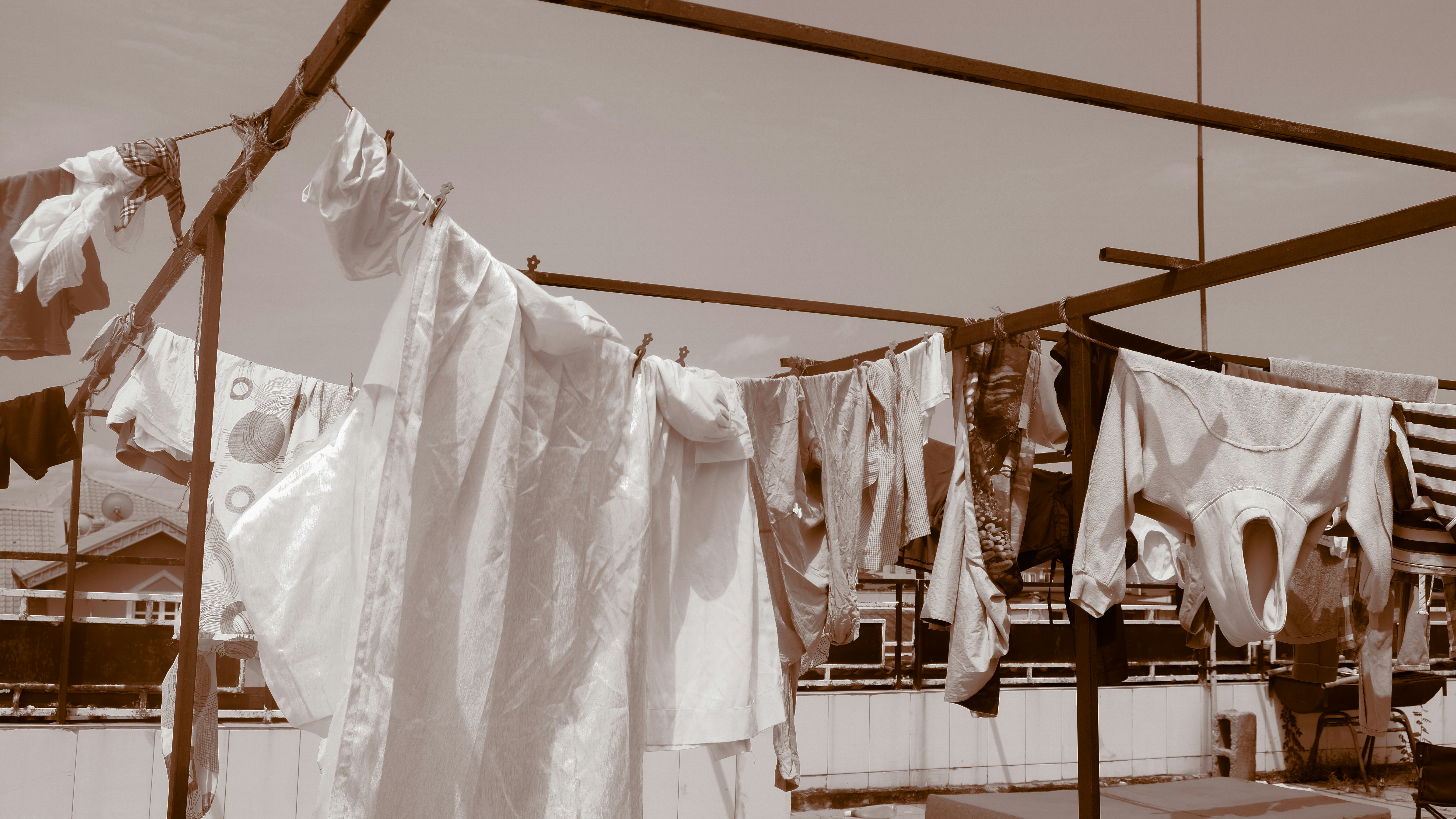 Laundry Lines in Sepia: A Quiet Balcony of Garments