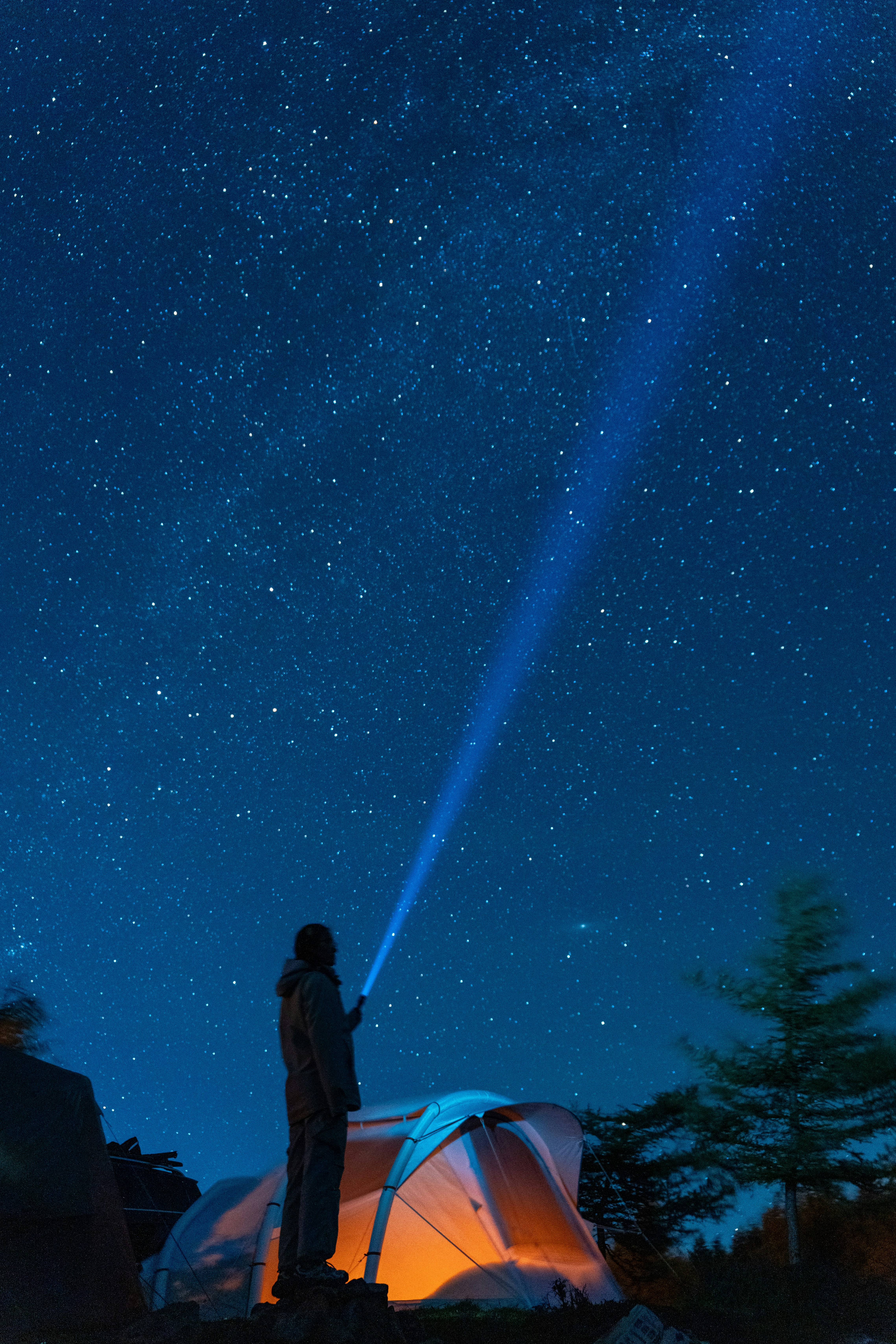 Starbeam Scout: A Night-Tent Vigil Points a Skyward Beam