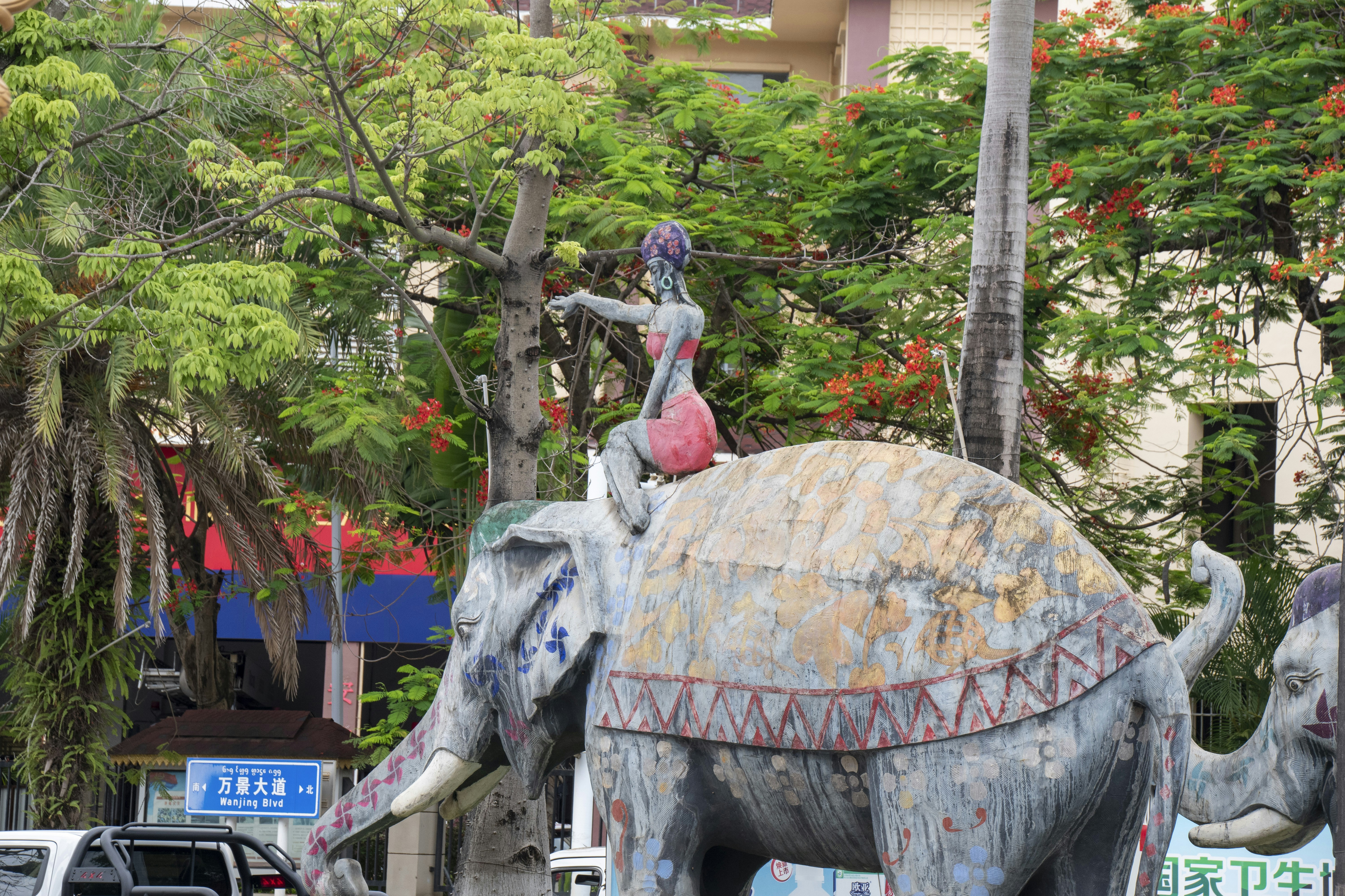 Statue of the Elephant in a Lush Urban Square