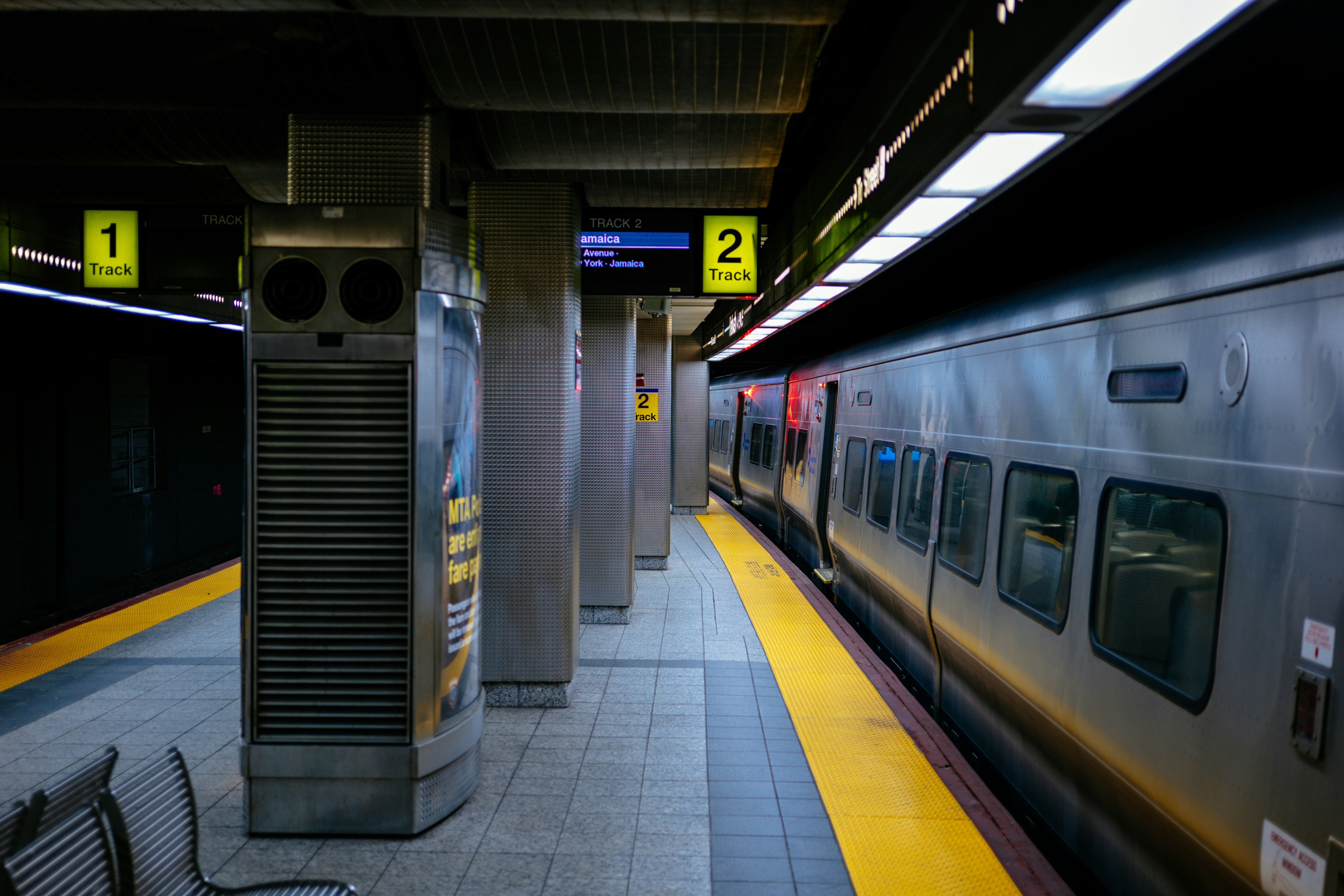 Platform Edge Portrait: Train at the Neon-Glow Stop