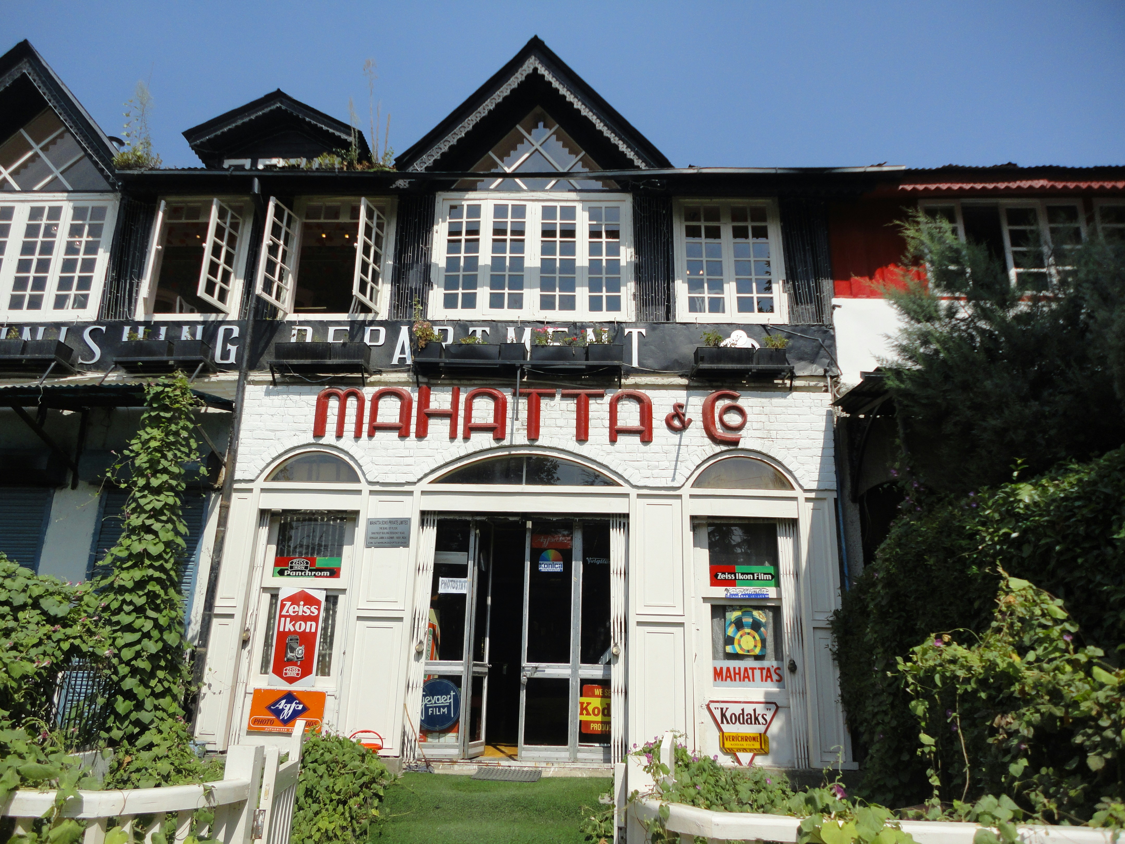 Mysterious Storefront of Mahatta & Co: A Nostalgic Facade Covered in Ivy