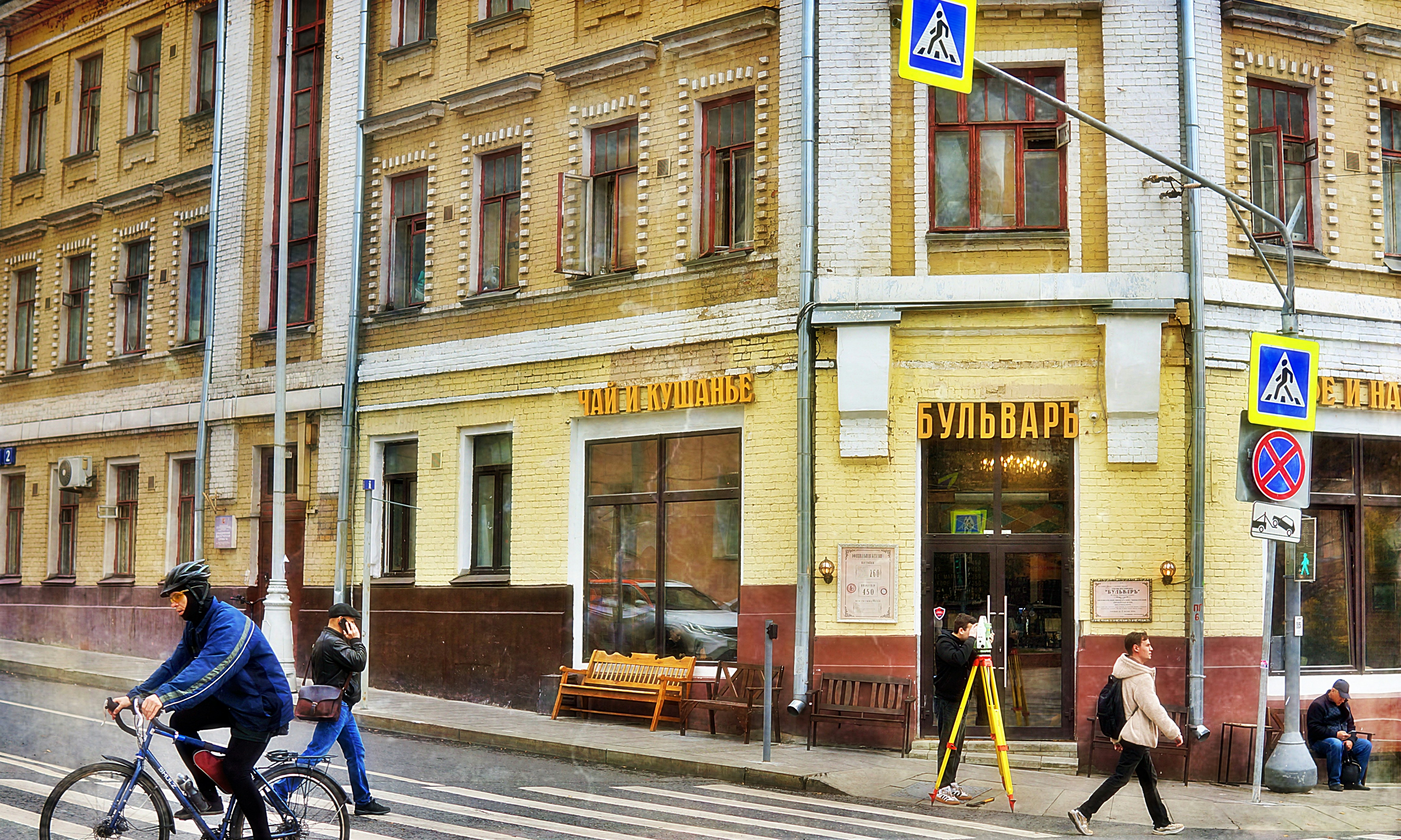 Echoes of a City Crossing: A Quiet Moment by the Pedestrian Café