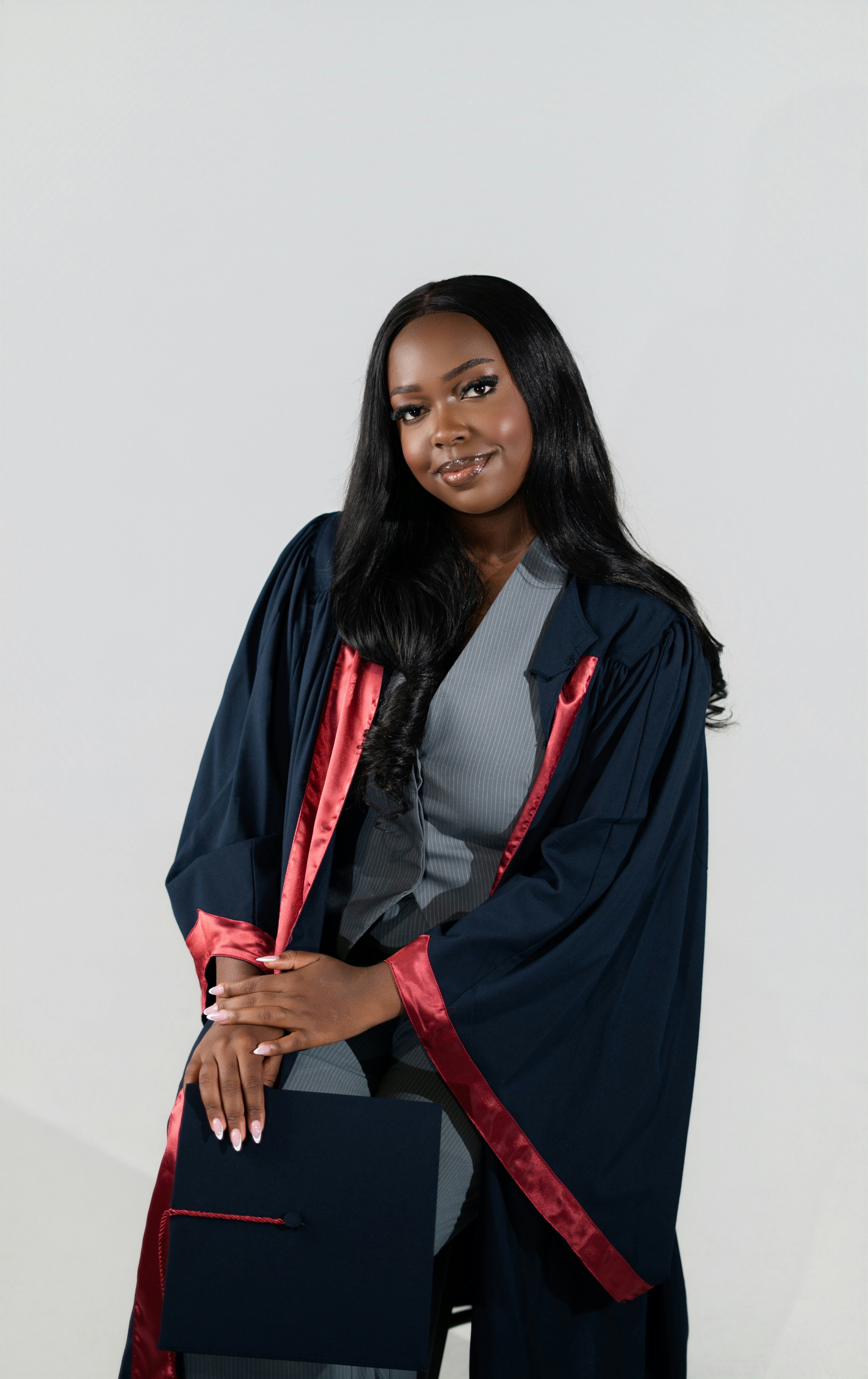 Graduation Glow: Portrait of Confidence in Academic Attire