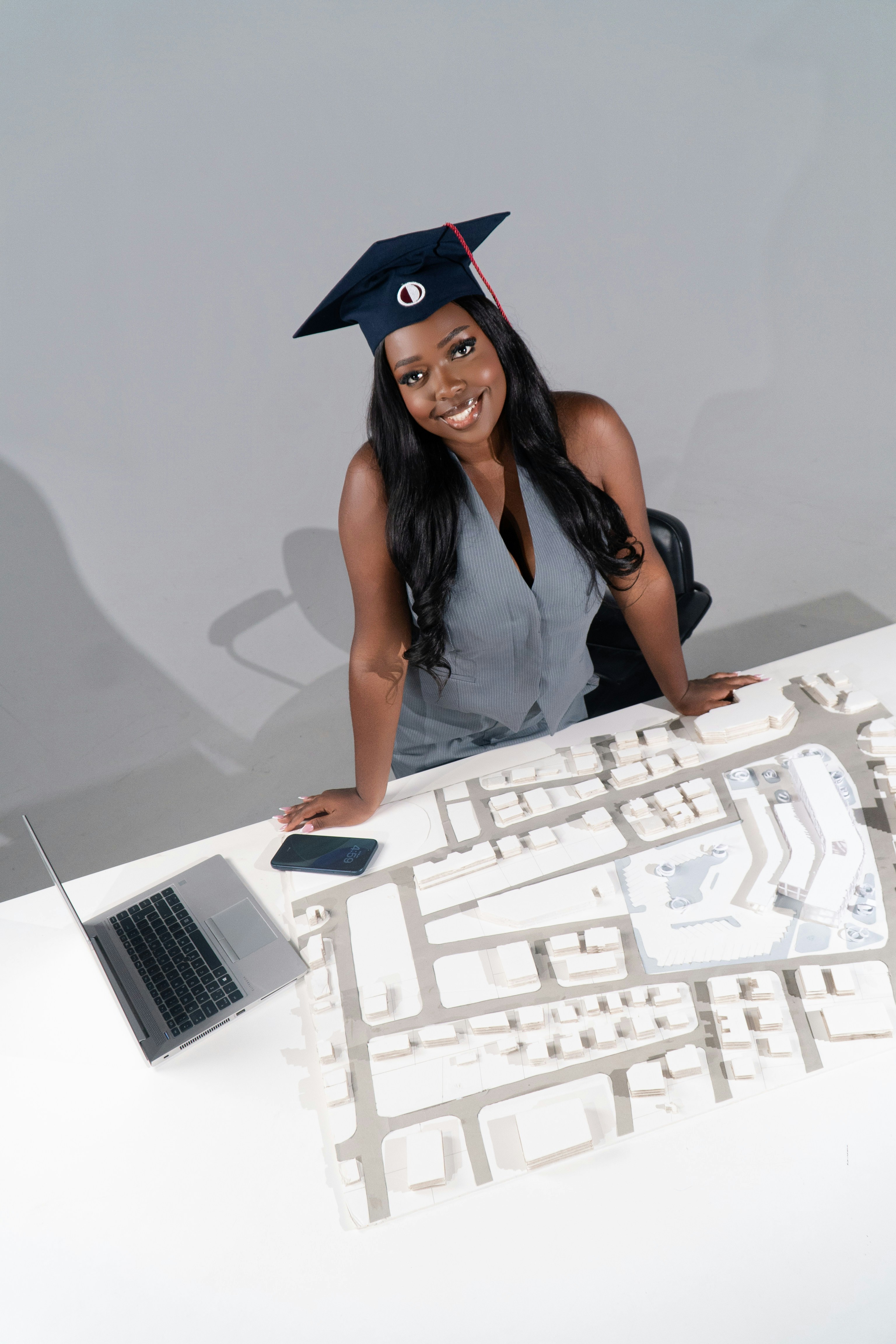 Graduation Glow Over a Modern Layout Model