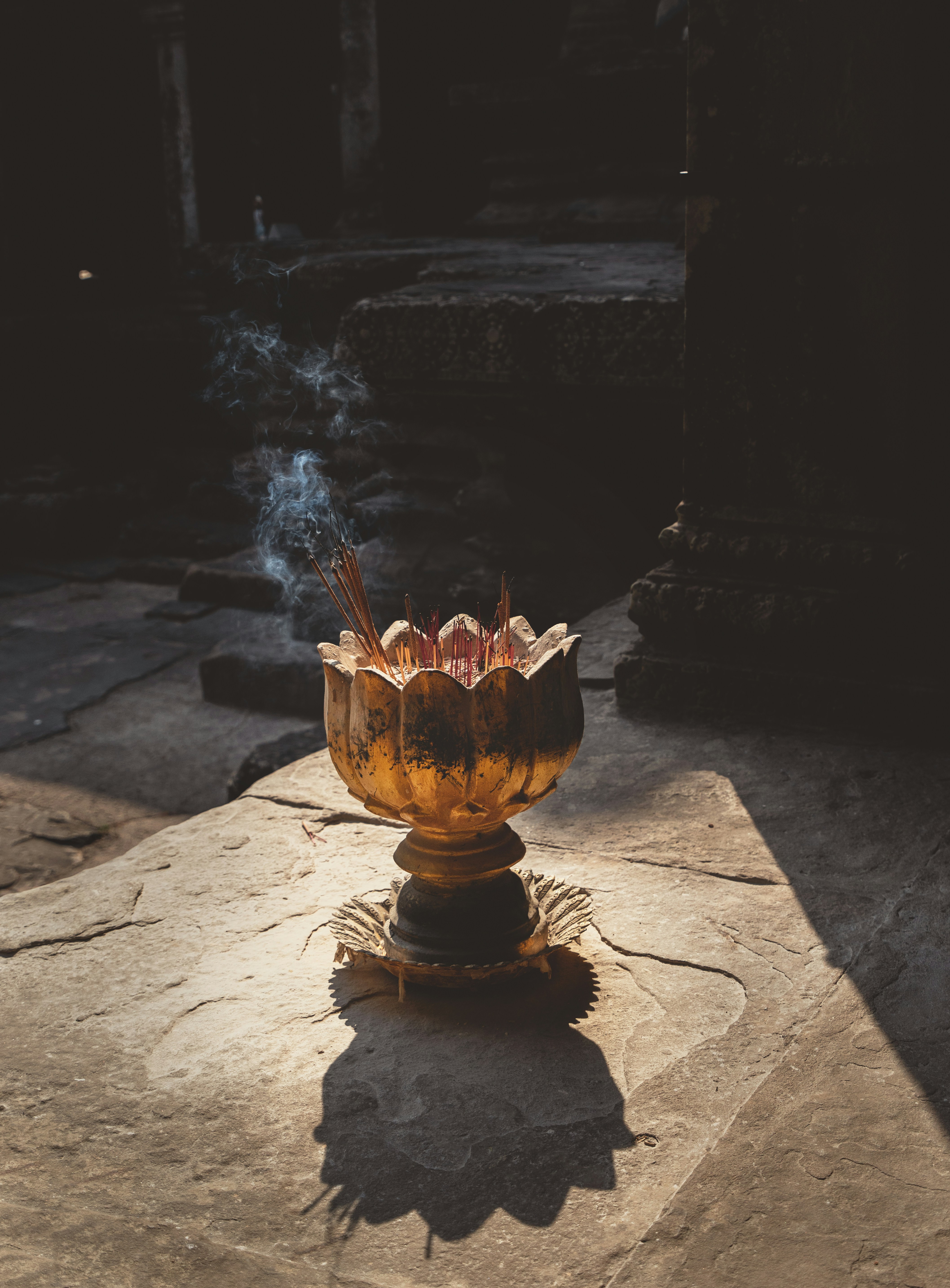 Incense of Light: A lone flame in sacred stone