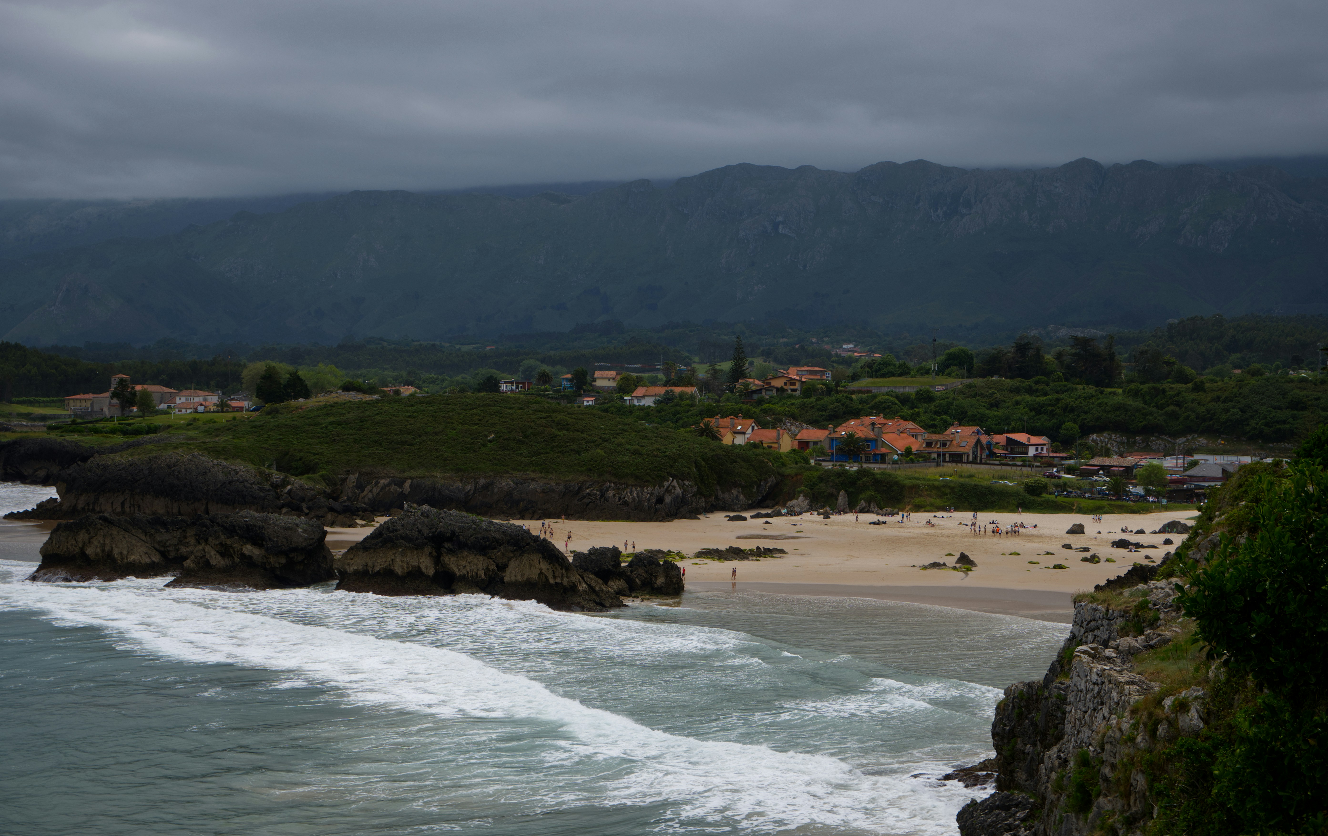 Coastal Village Nestled Between Sea and Hills