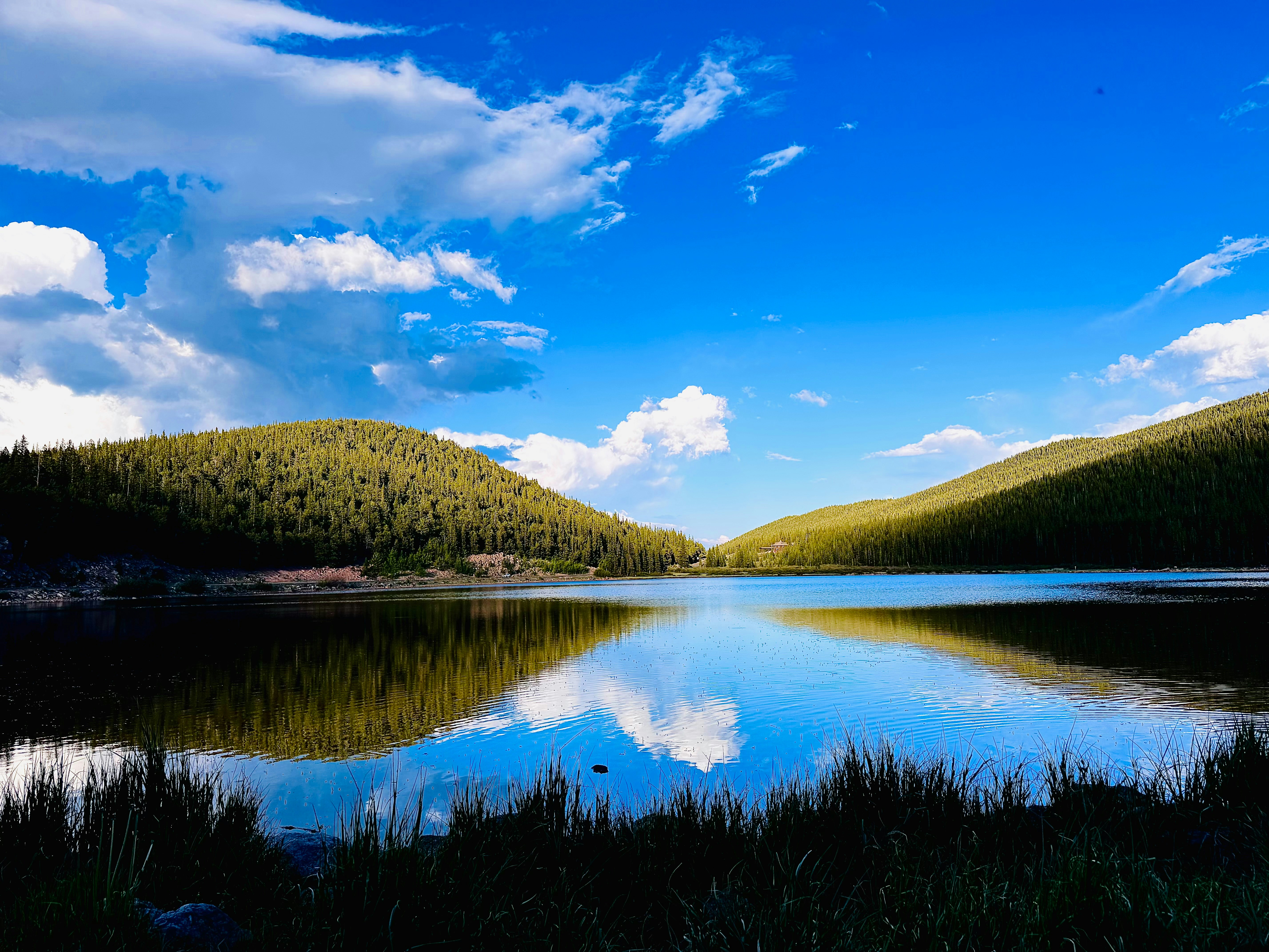 Mirror Lake Under a Sky of Blue Peaks