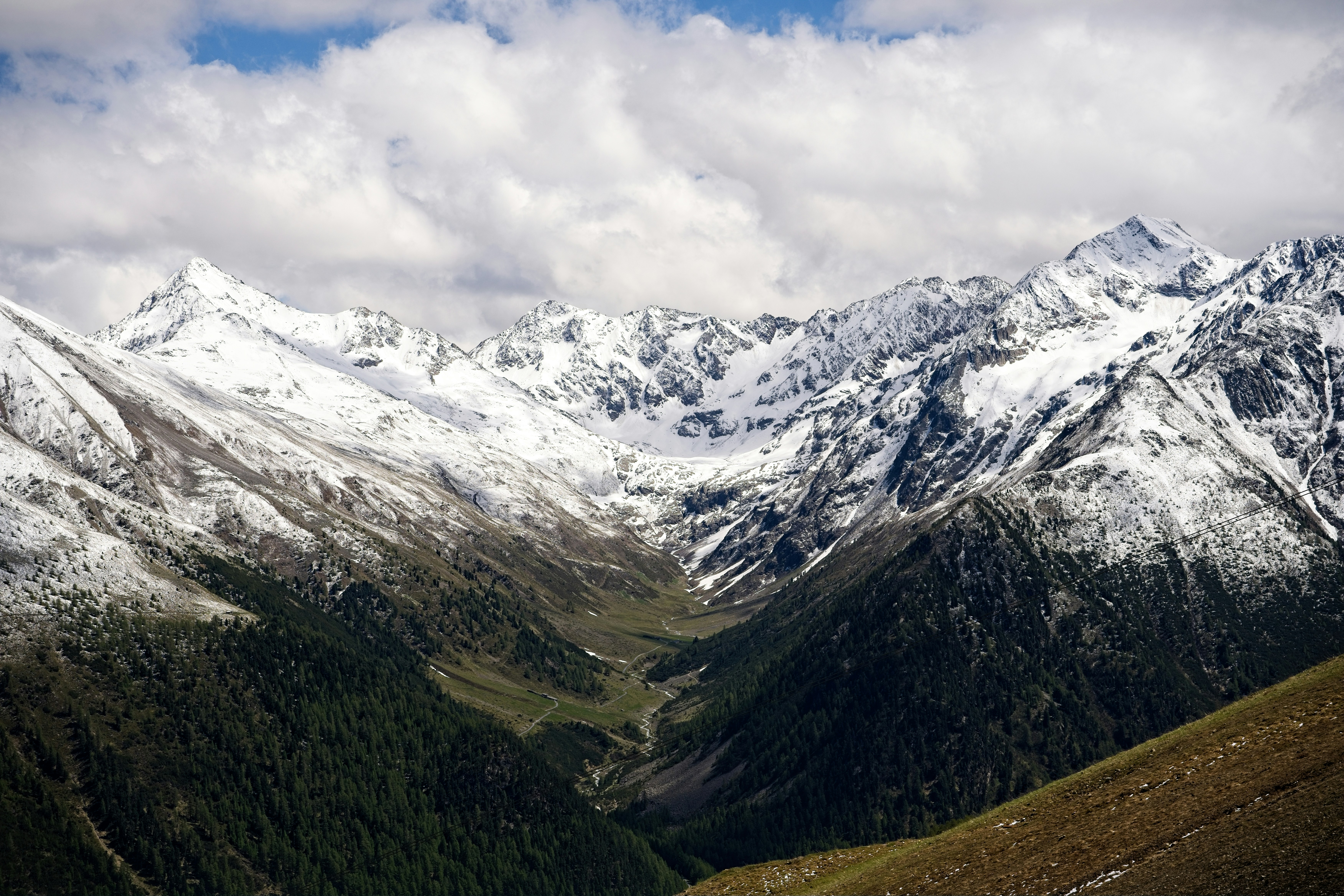 Snowbound Spine: A Valley Between Ice-Crowned Ridges