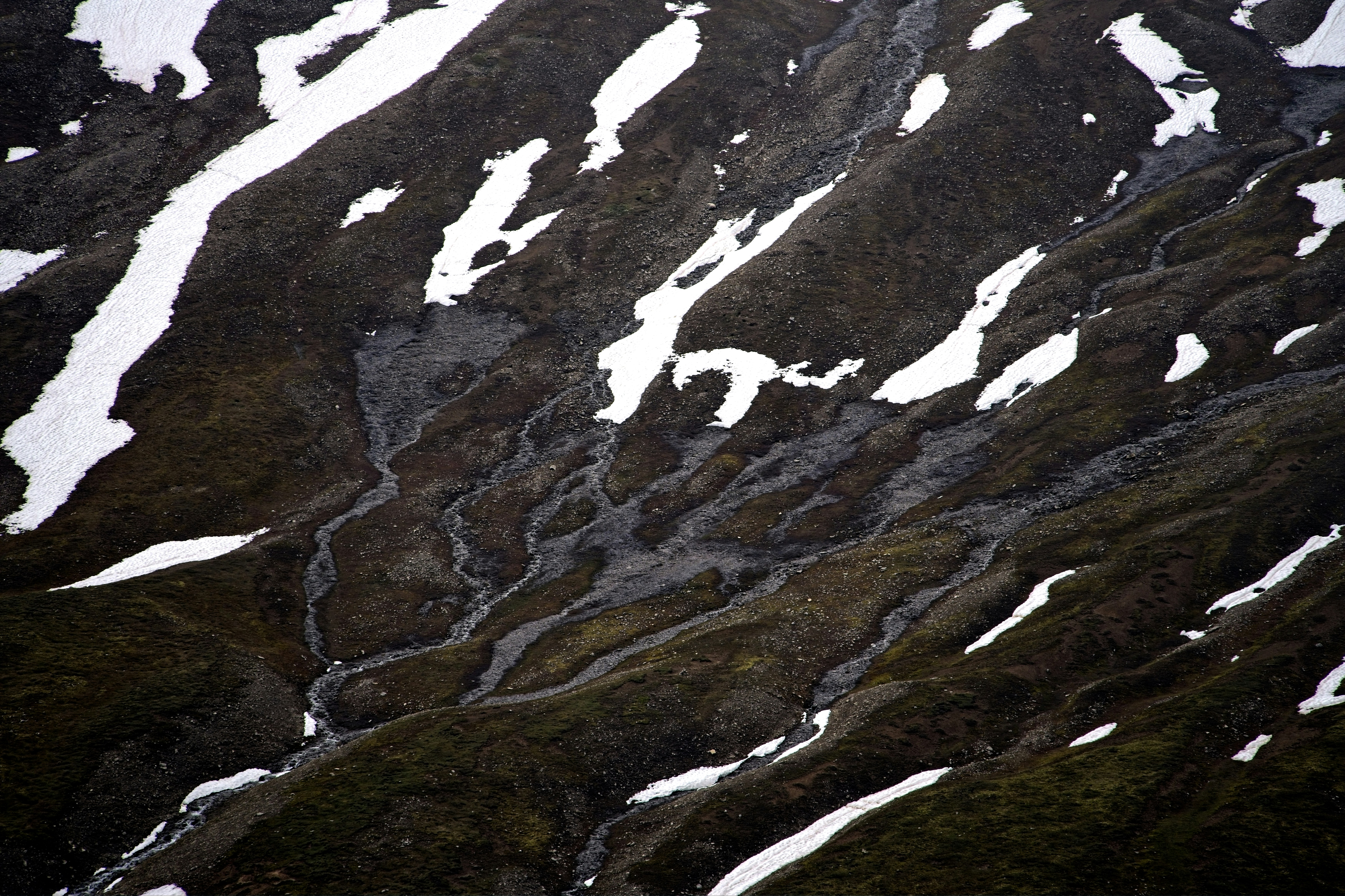 Snow-veined Highlands: Meandering Valleys in Distant Light