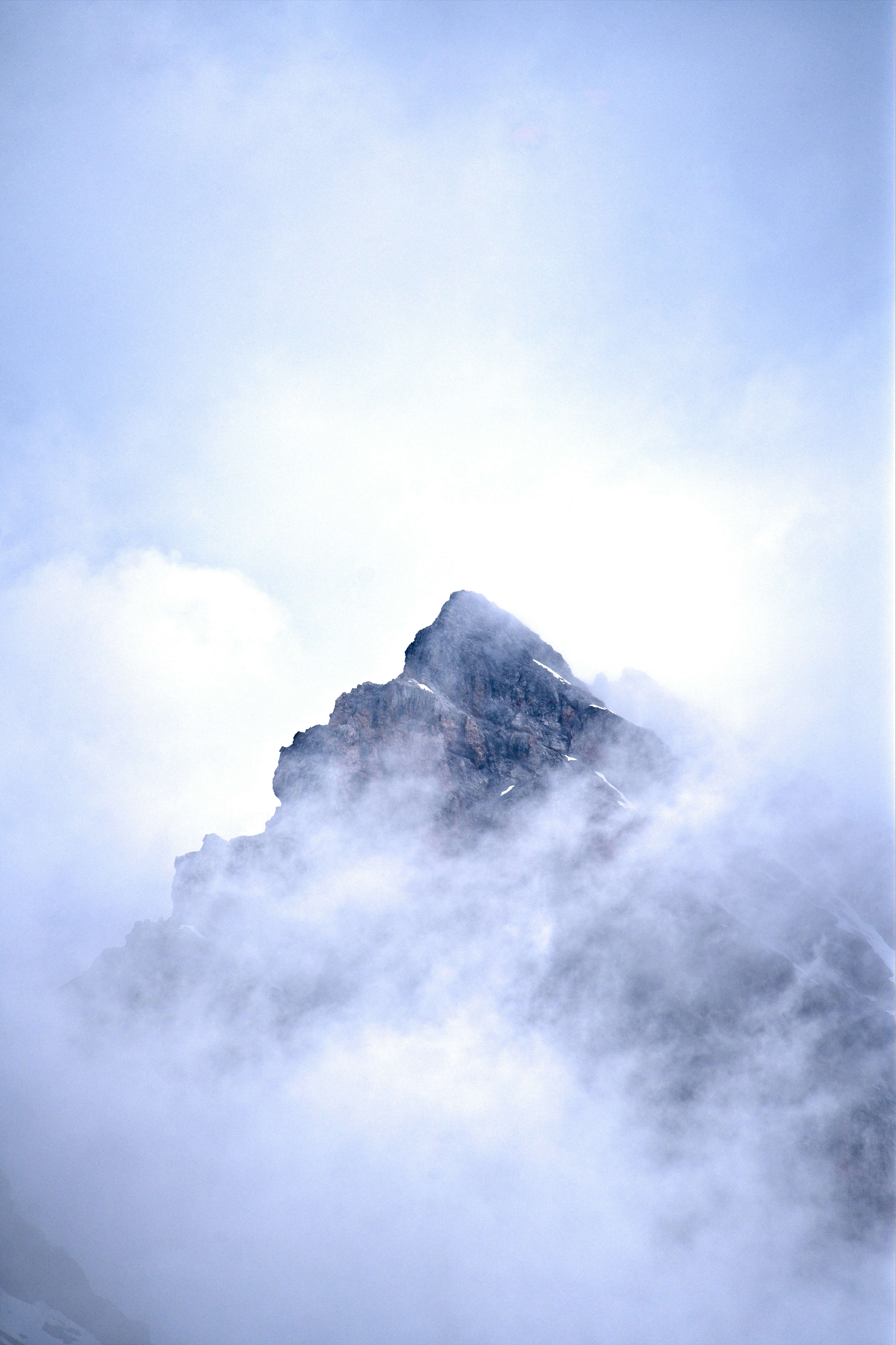 Mist Crowned Peak: A solitary summit piercing a sea of clouds
