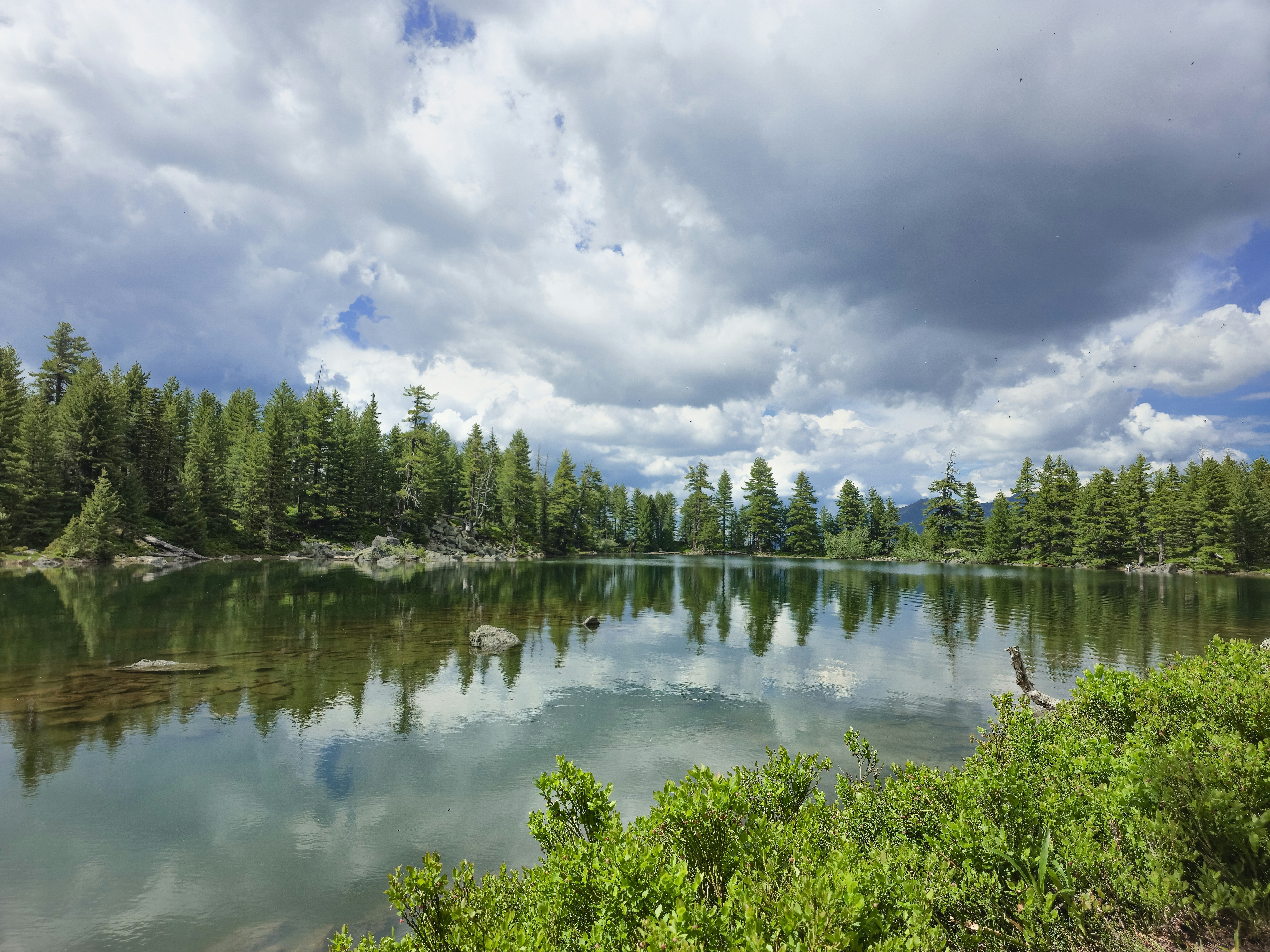 Mirror Lake under a Stormy Sky