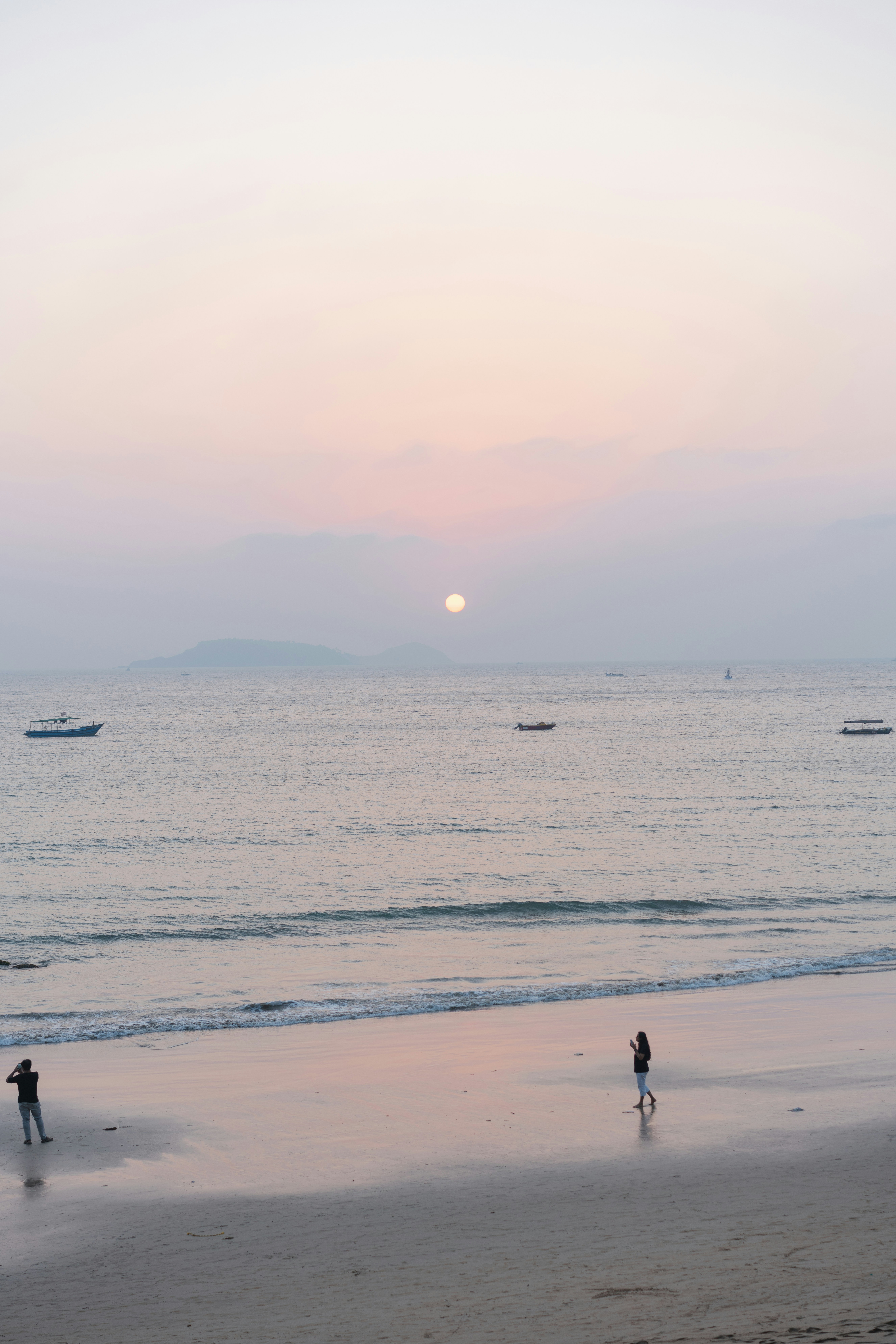 Dusk at the Quiet Shore: A Sunset Silhouette by the Sea