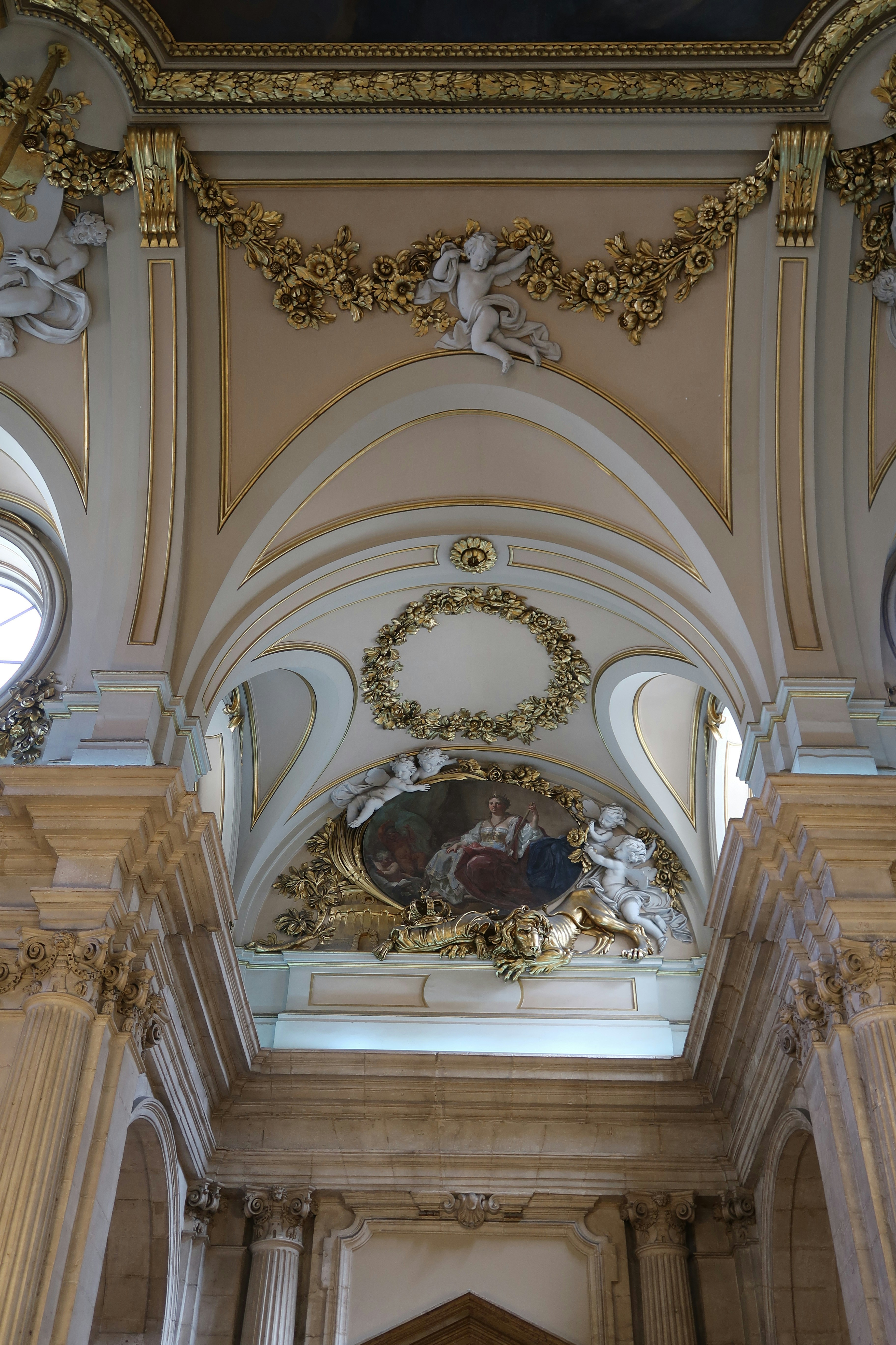 Baroque Cathedral Archway with gilded stucco and painted oval fresco