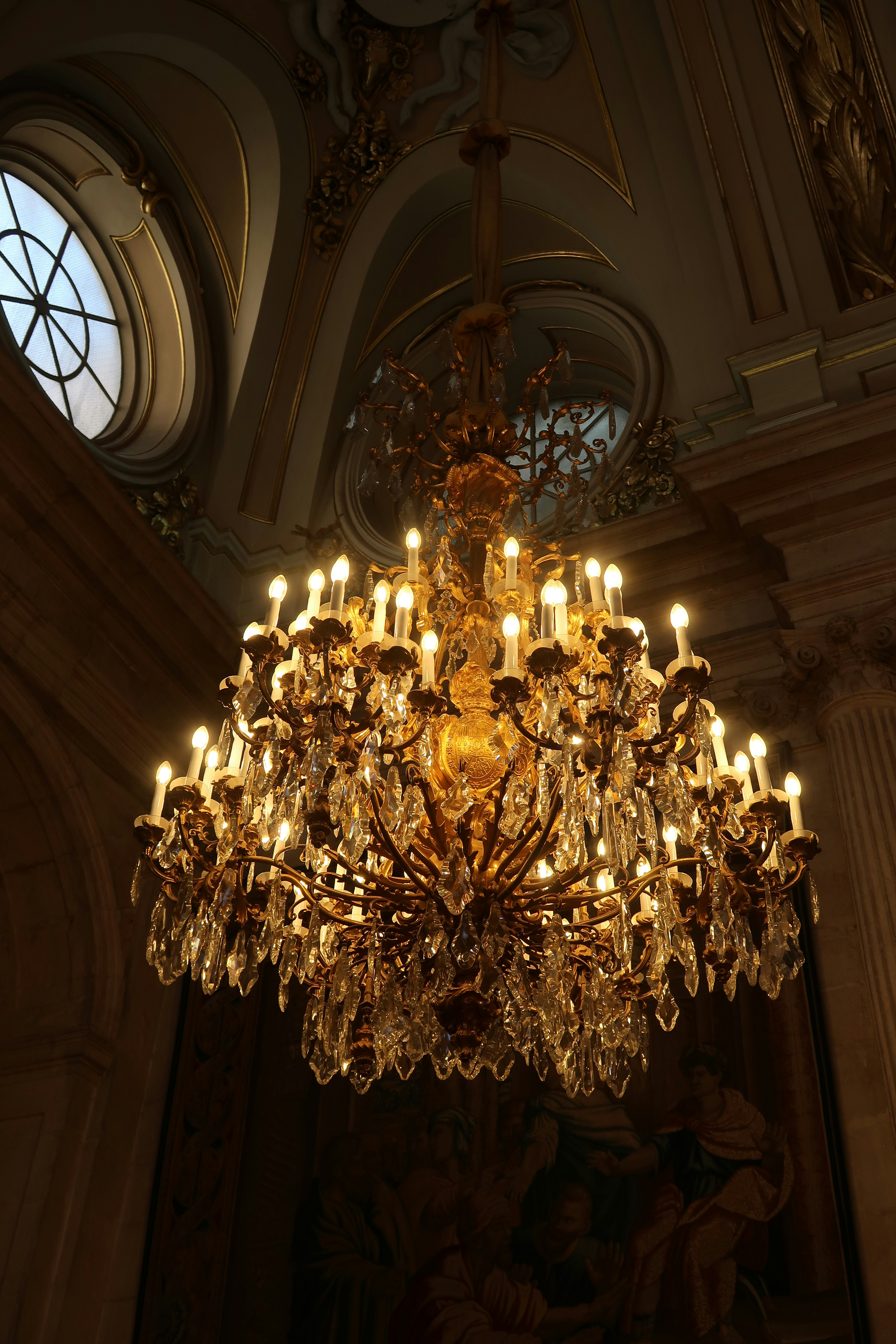 Golden Chandelier Amid Baroque Vaults