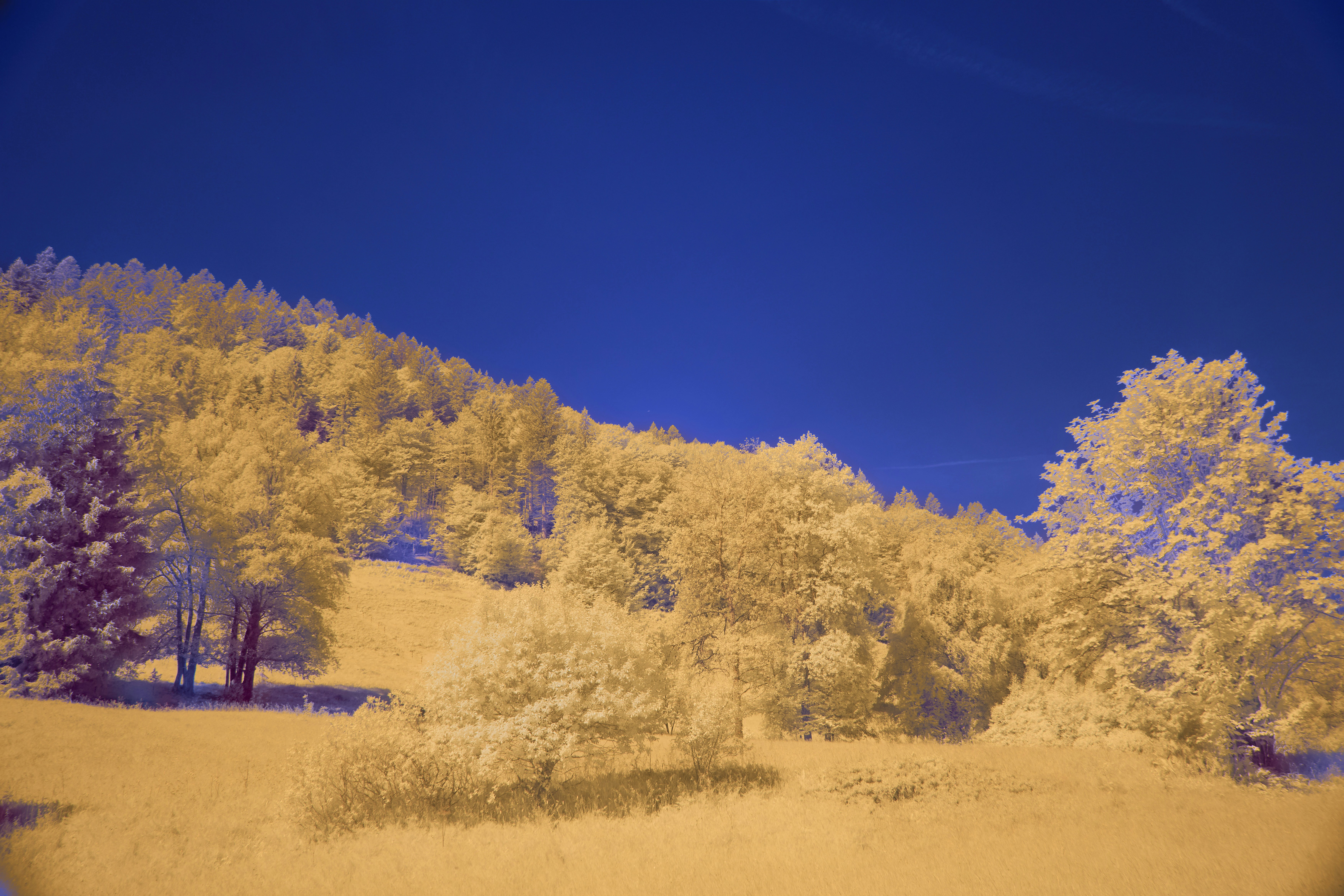Iridescent Hills Under a Velvet Sky
