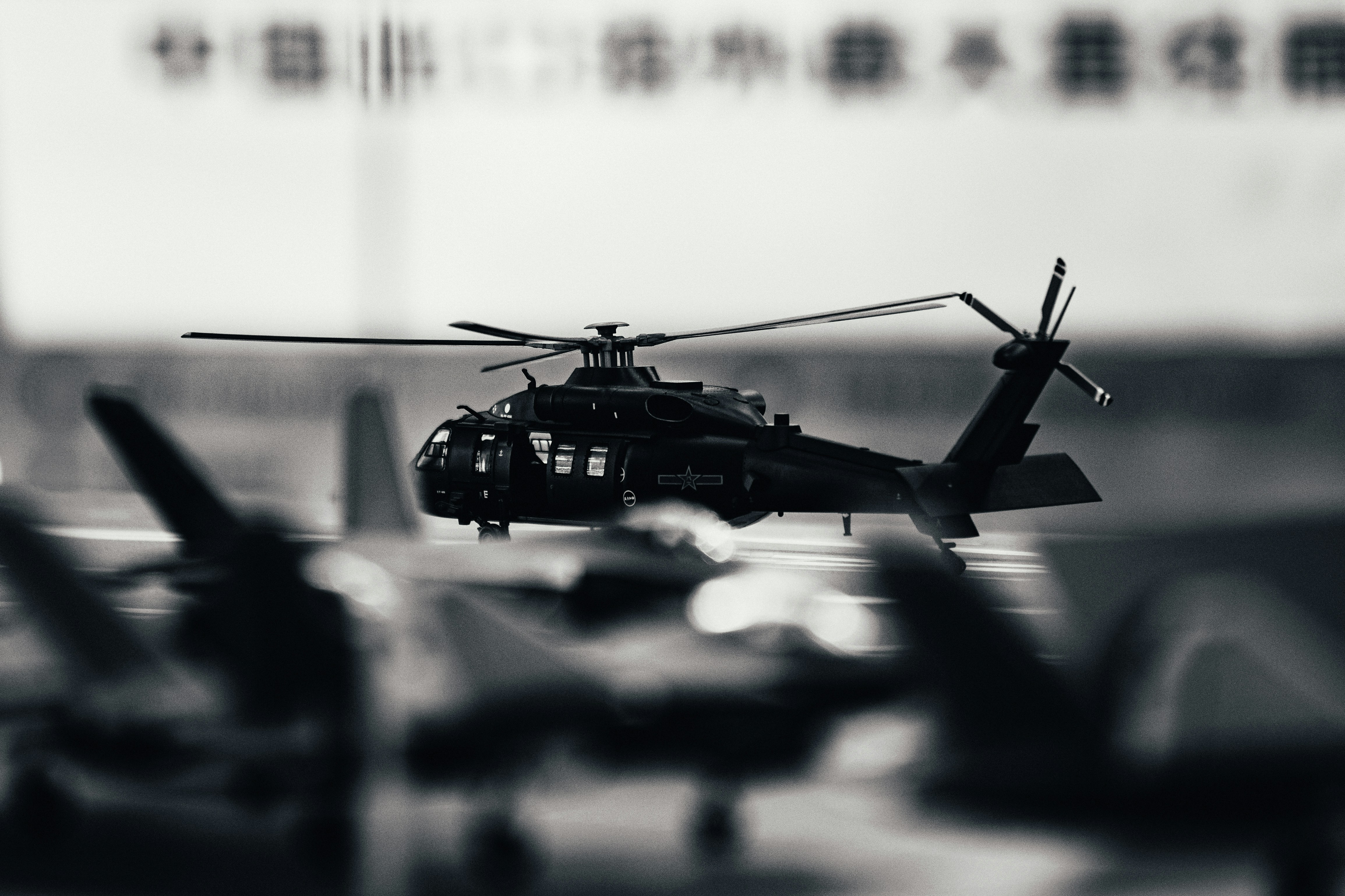 Shadow of the Blade: A Hovering Spearhead in a Quiet Hangar