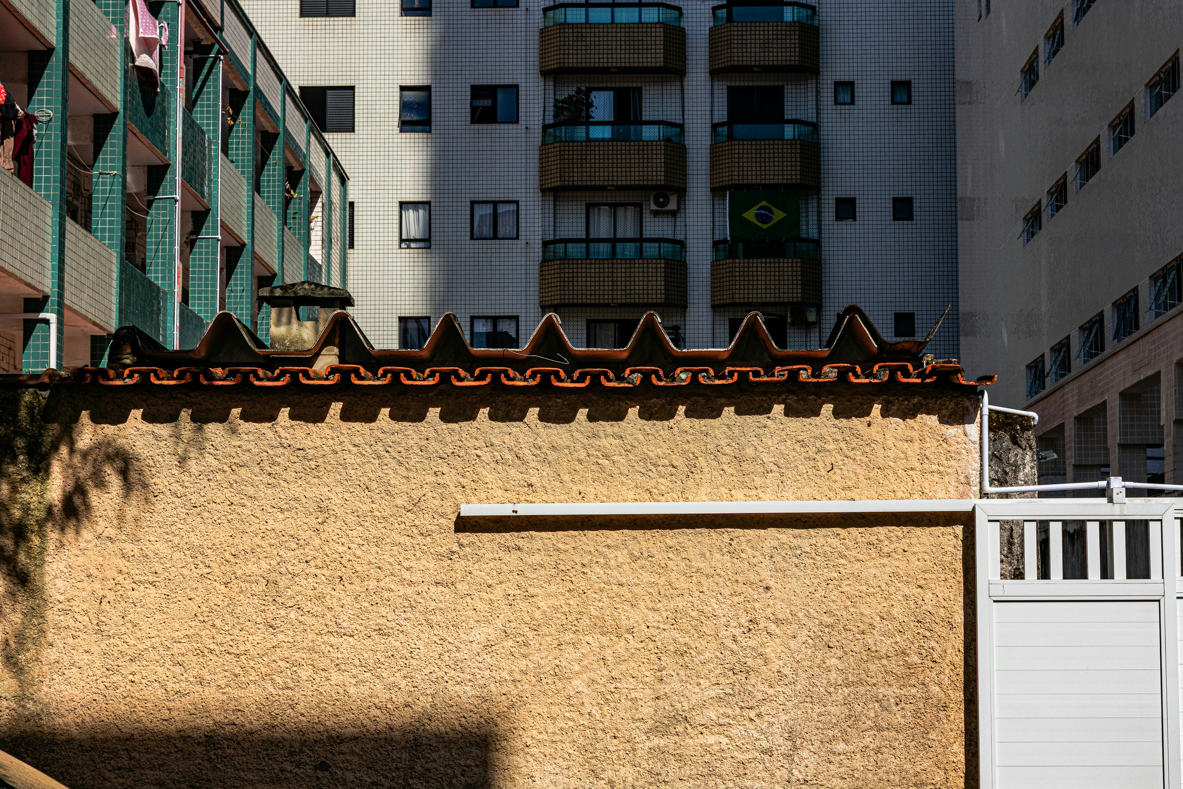 Terracotta Roofline Against Urban Backdrop