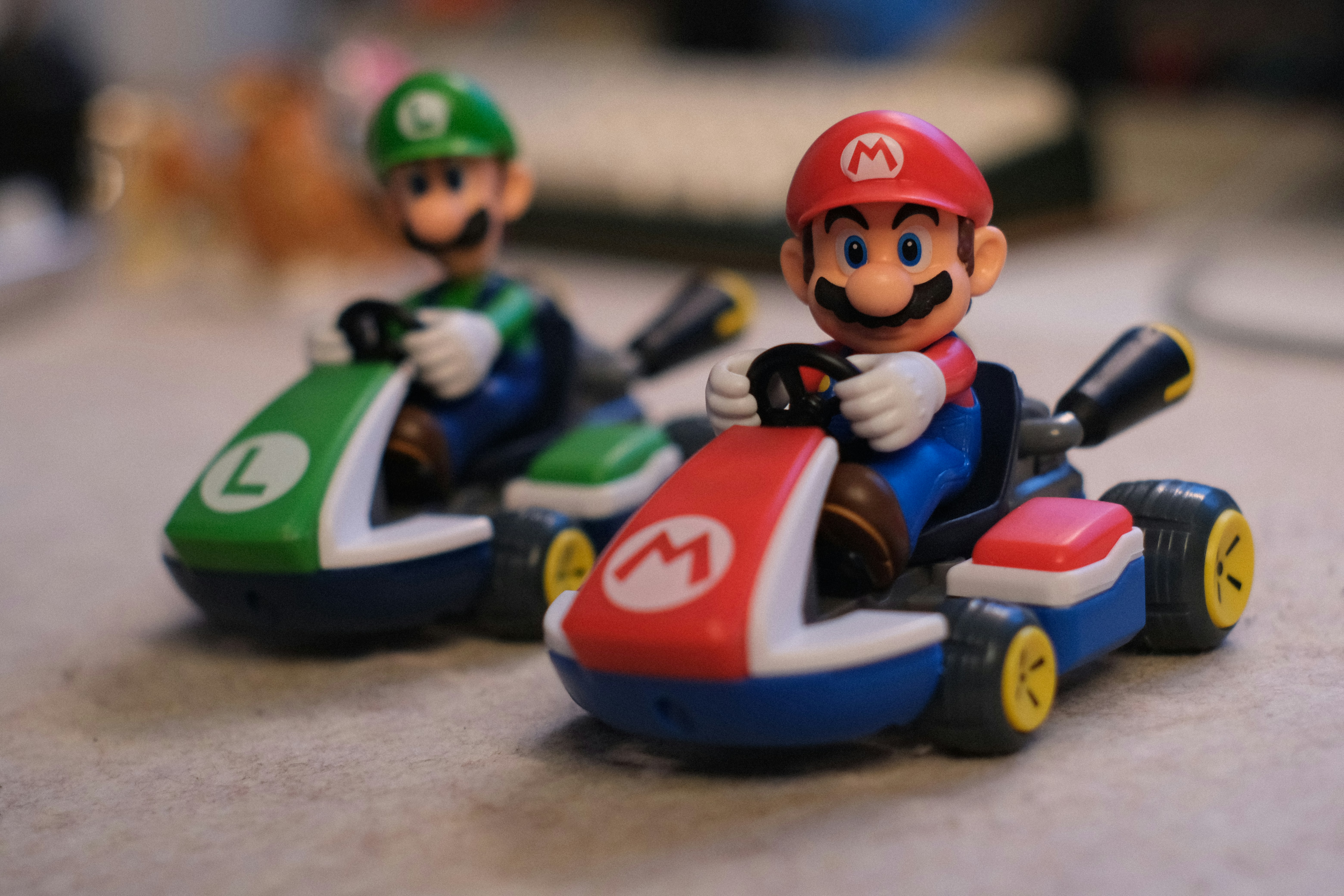 Kitted Go-Karts: Mario & Luigi in Mini Racers On a Cozy Surface