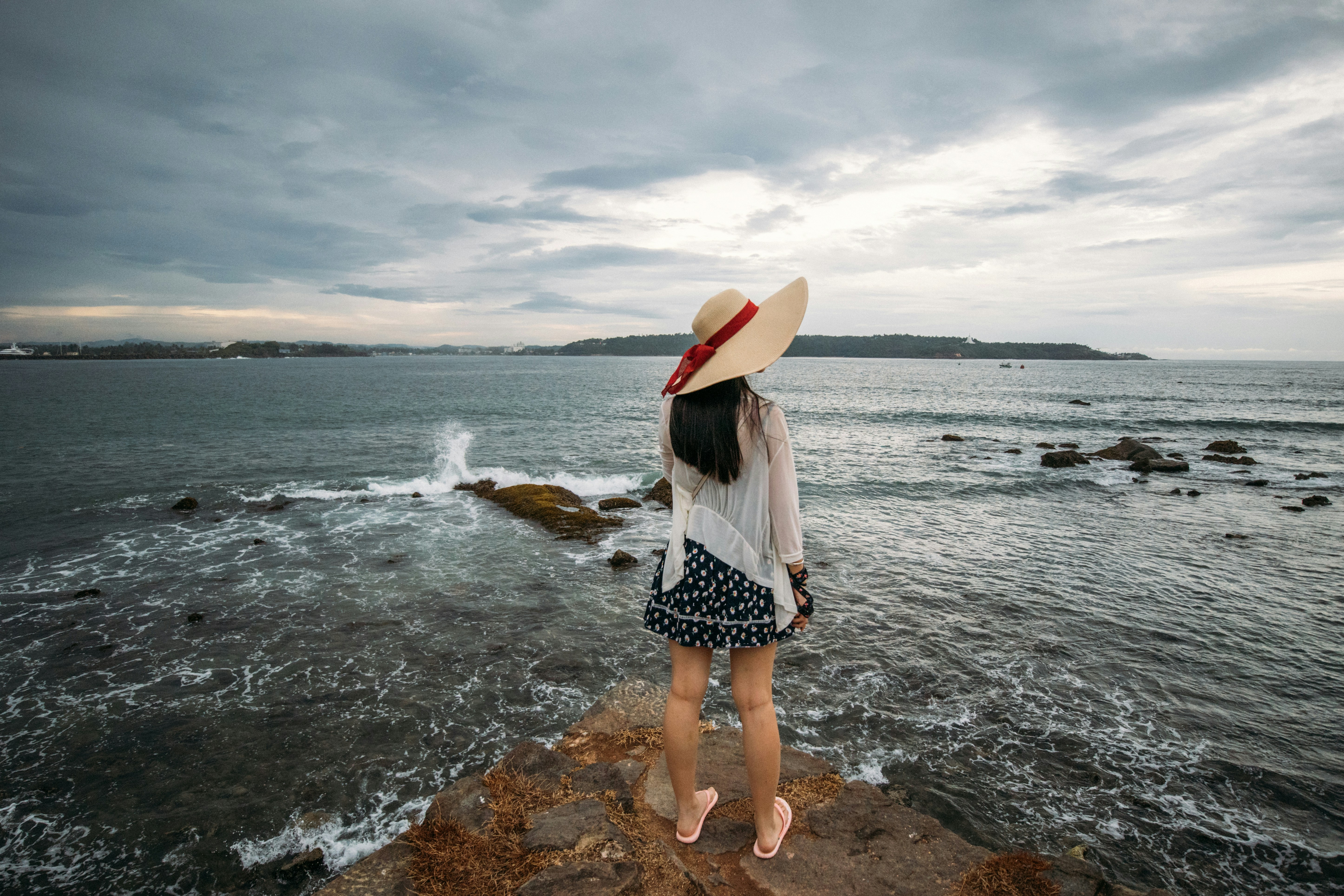 Sunlit Wanderer by the Quiet Tide