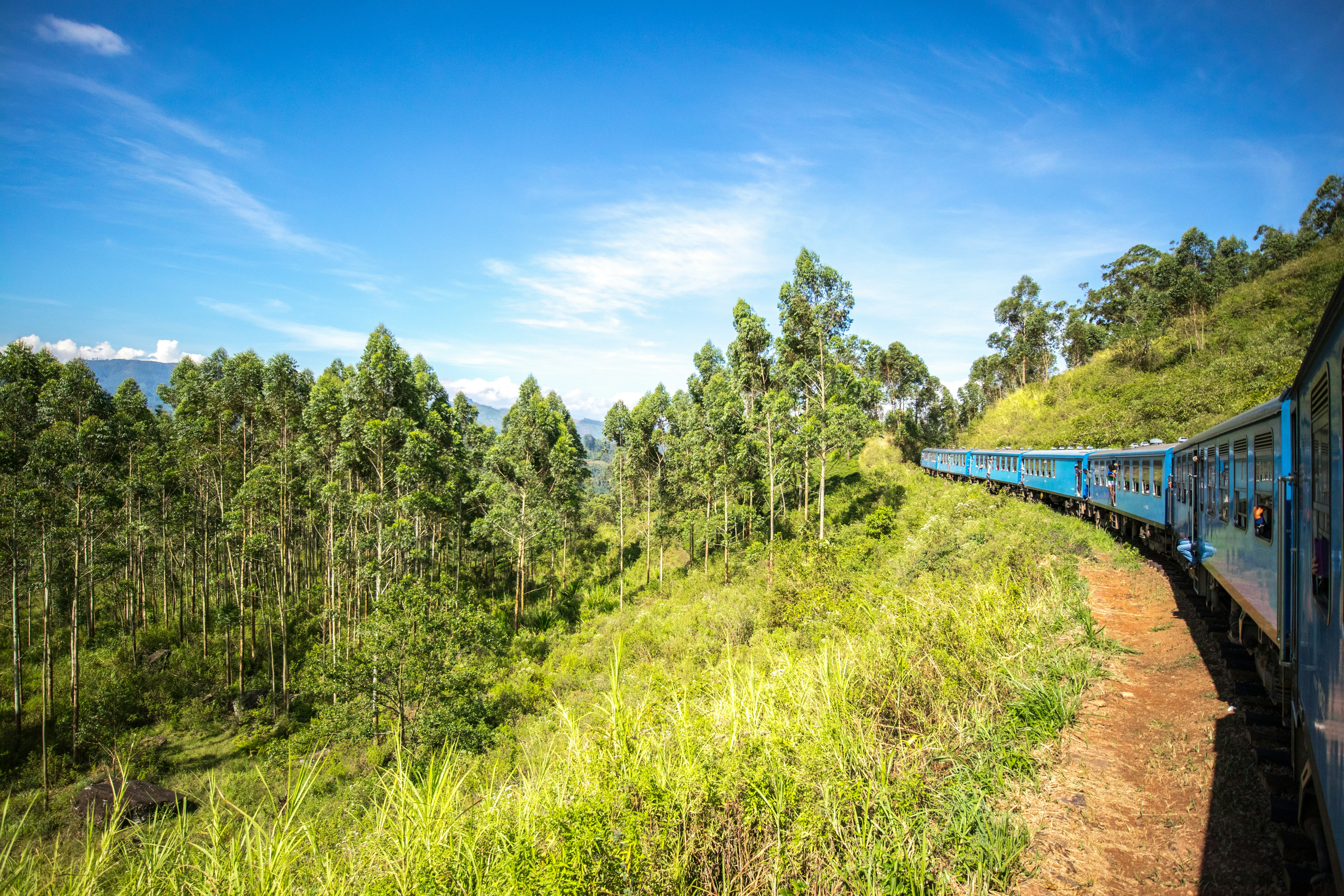 Blue Carriage on a Lush Ridgetop Line