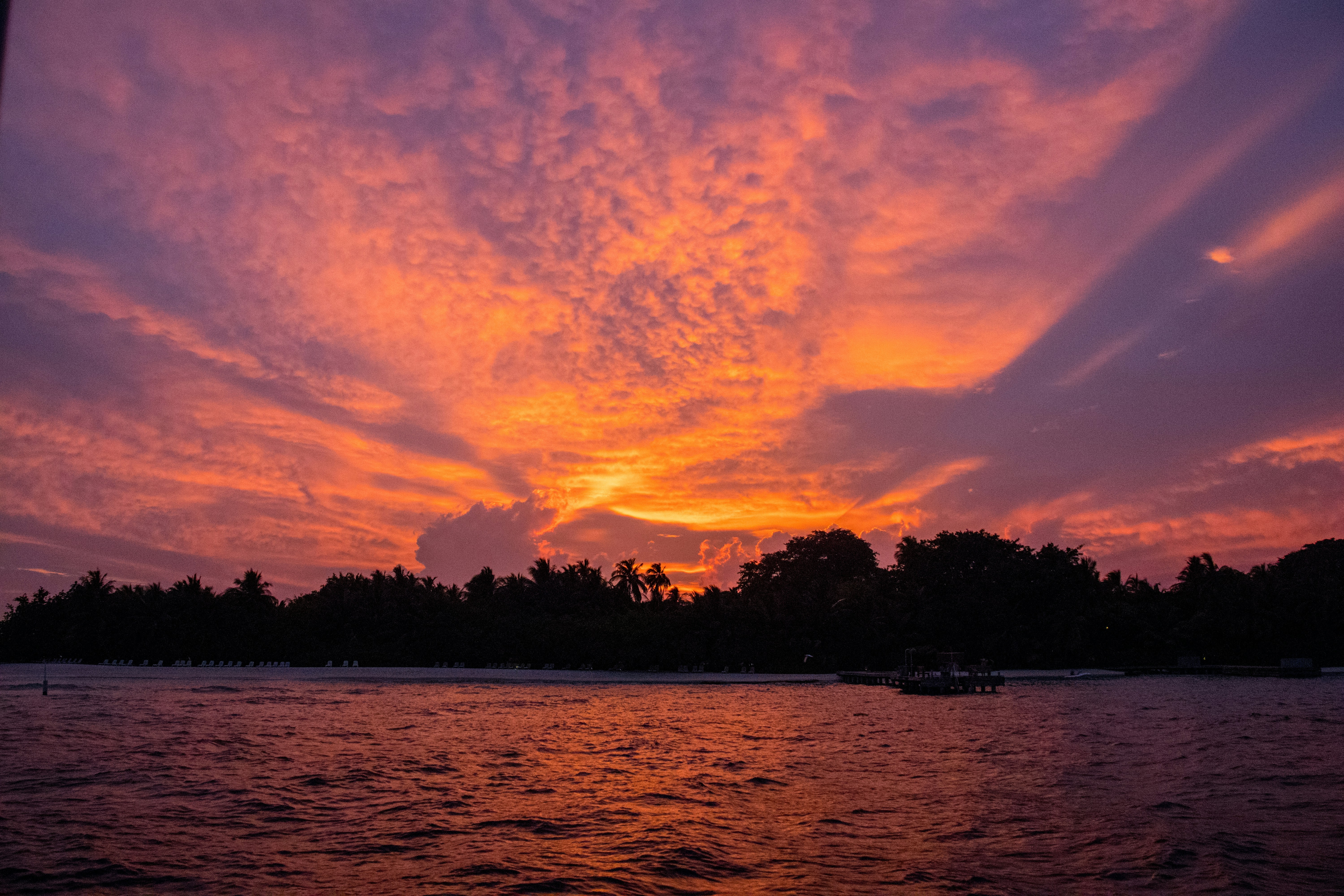 Crimson Horizon Over a Quiet Lake