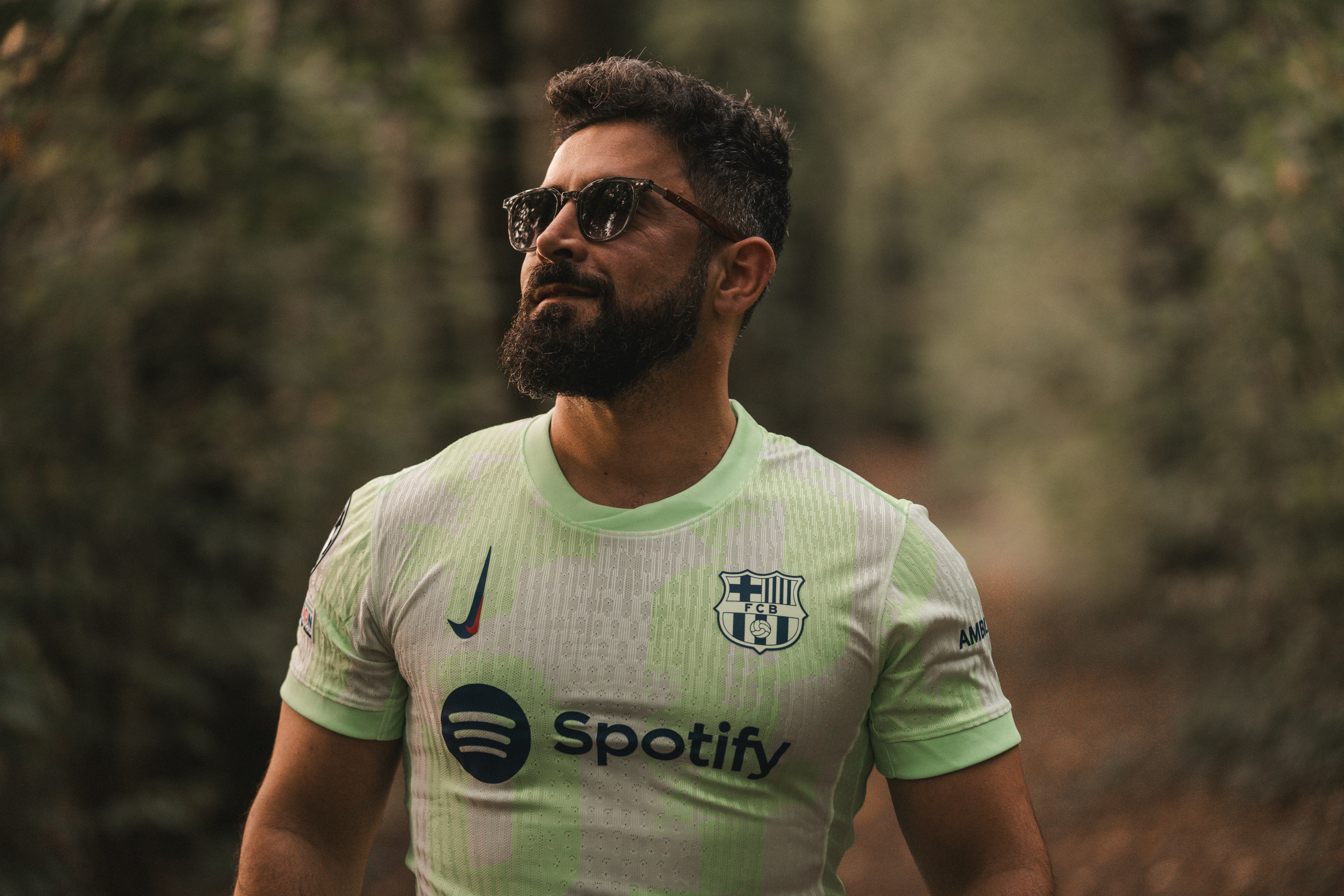 Midfield Confidence: A Forward-Stance Portrait in a Neon FC Jersey