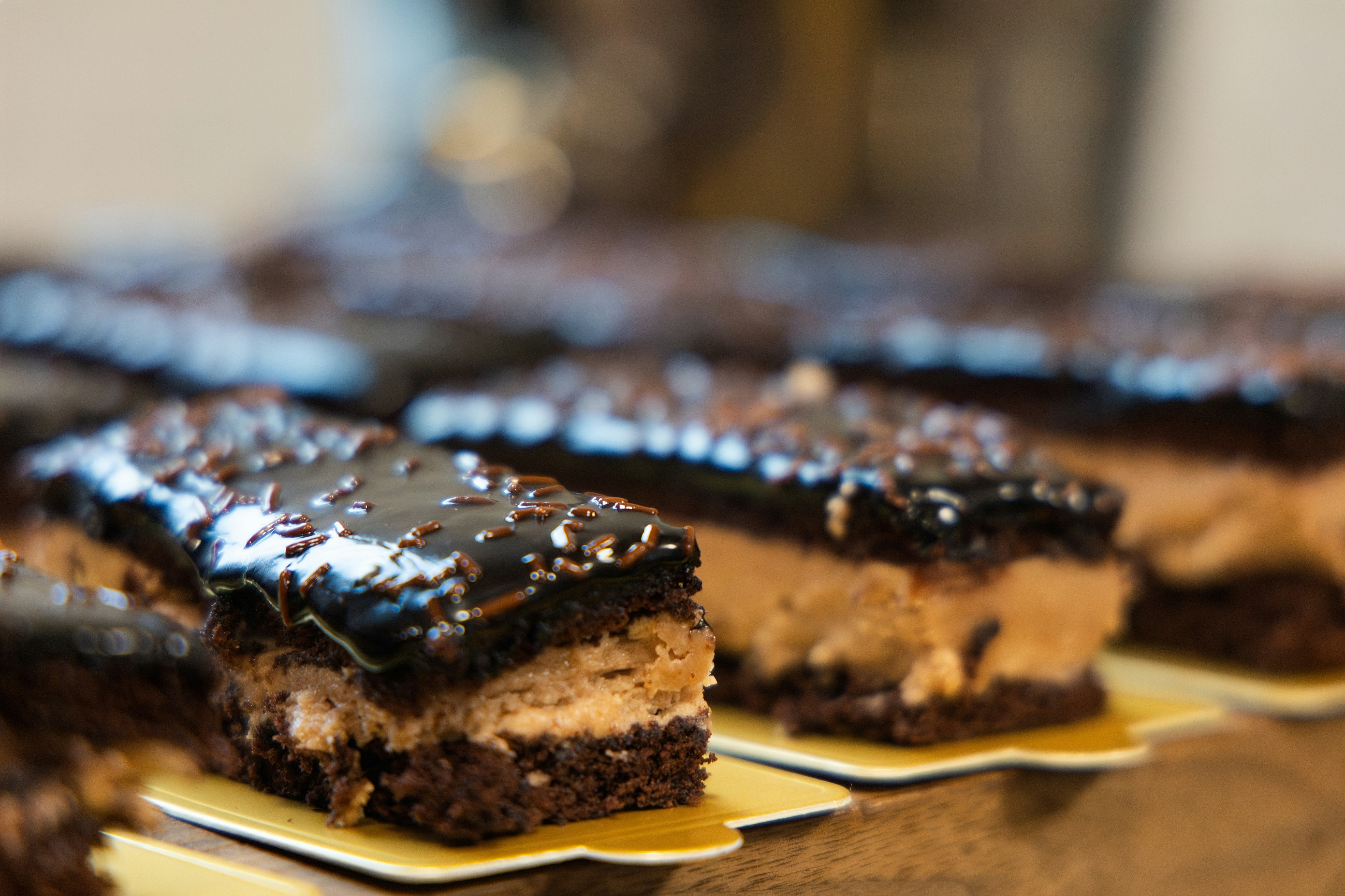 Glazed Chocolate Espresso Bars on a Rustic Display