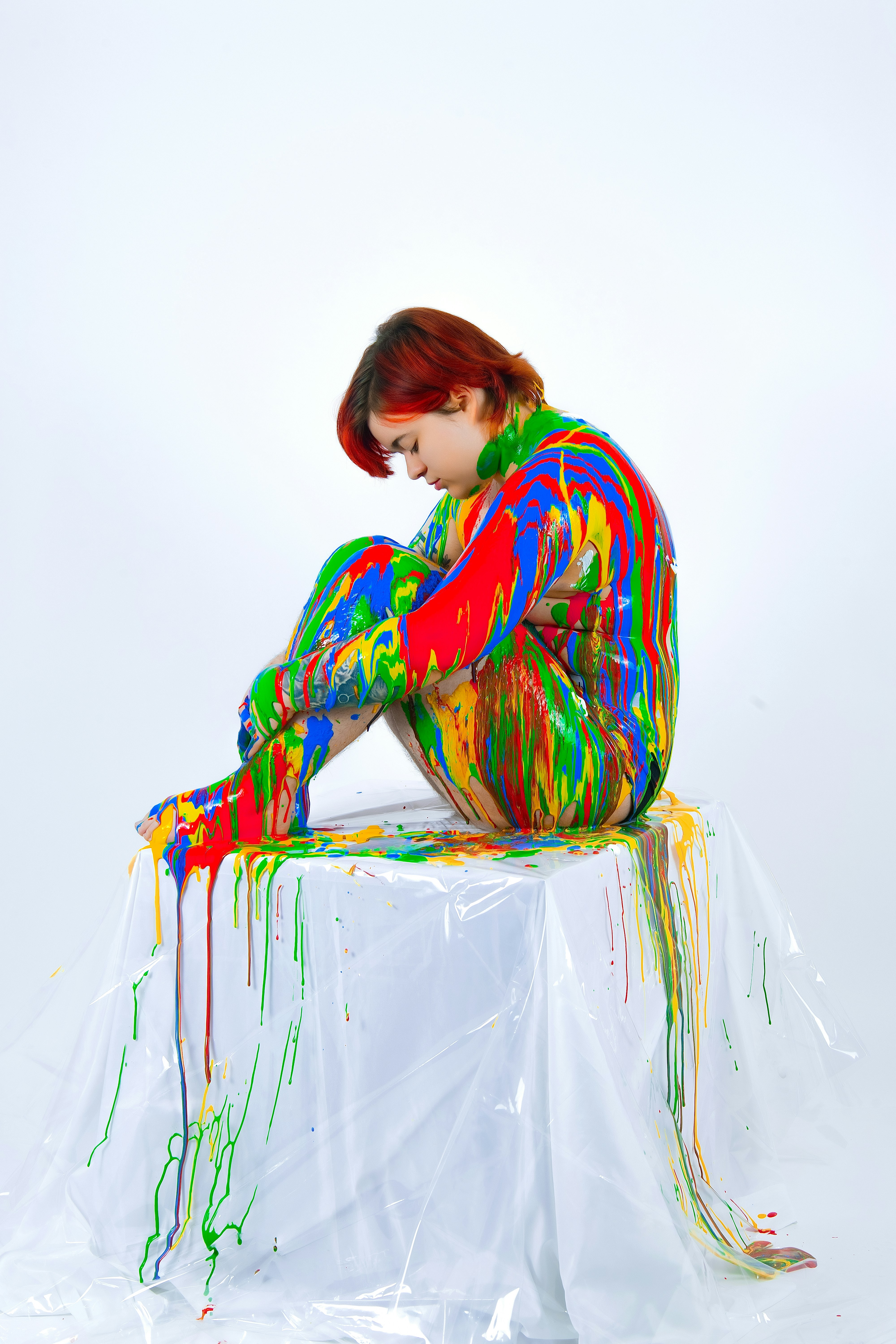 Chromatic Quiet: A Solo Pose Wrapped in Paint