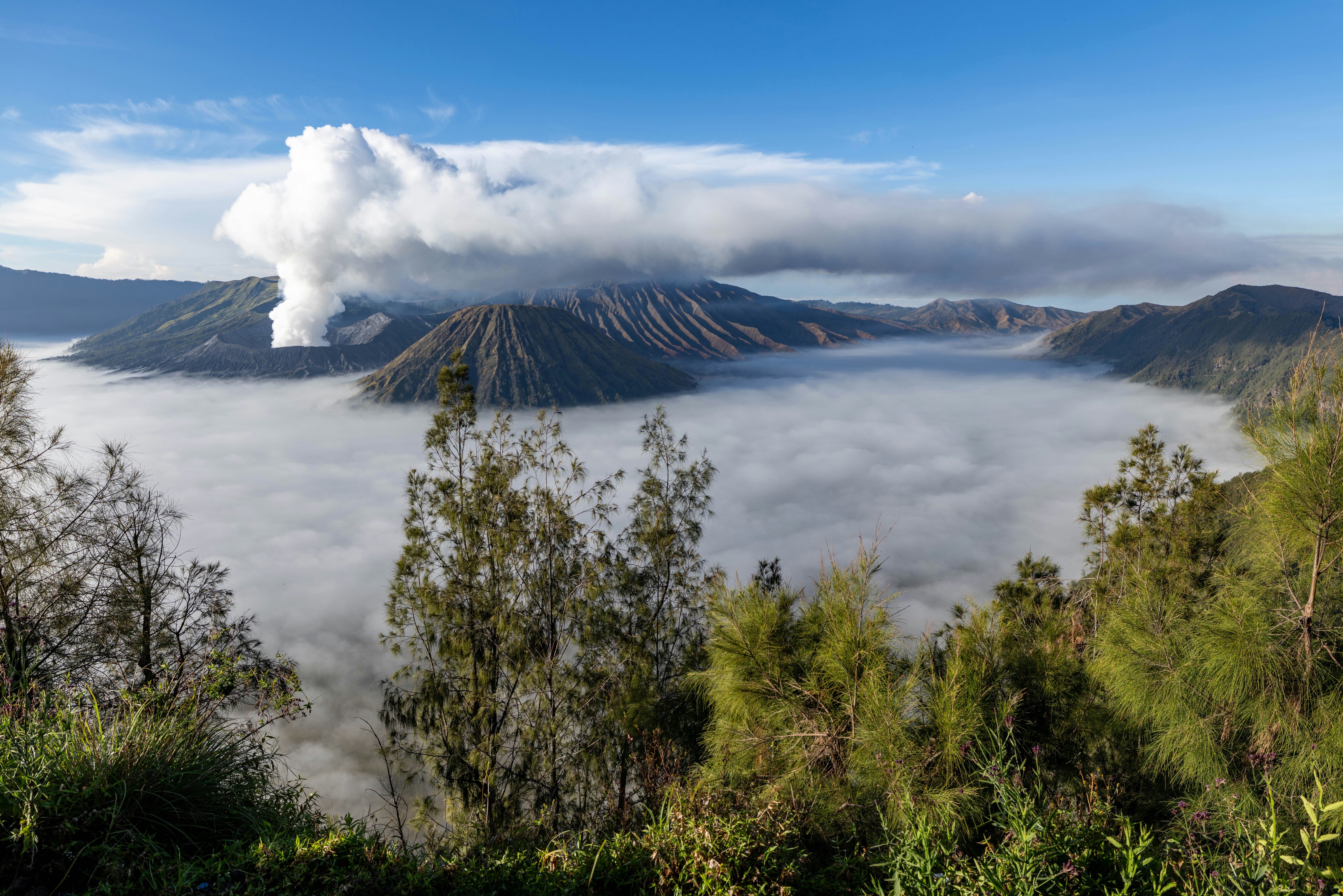 Mist-Layered Crater Dawn: Caldera Peaks above a Sea of Clouds