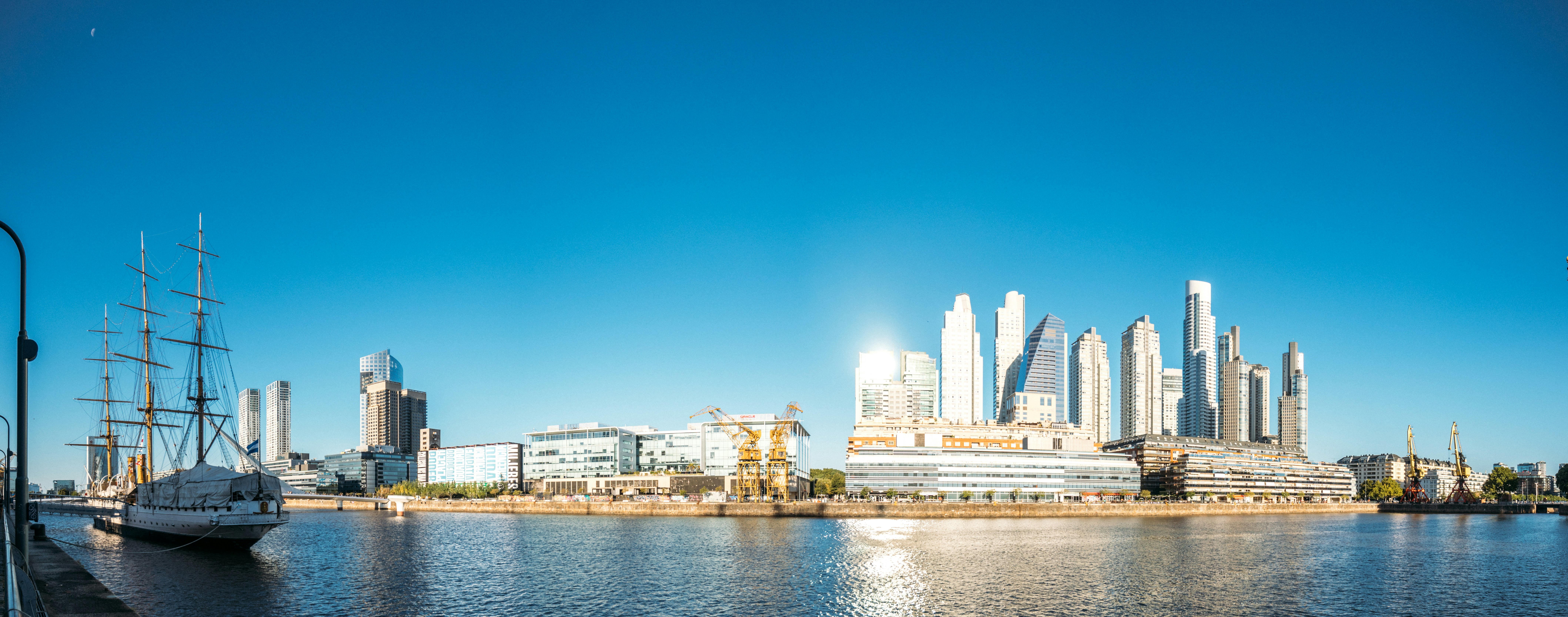 Harbor Panorama: City Skyline Reflecting on Quiet Waters