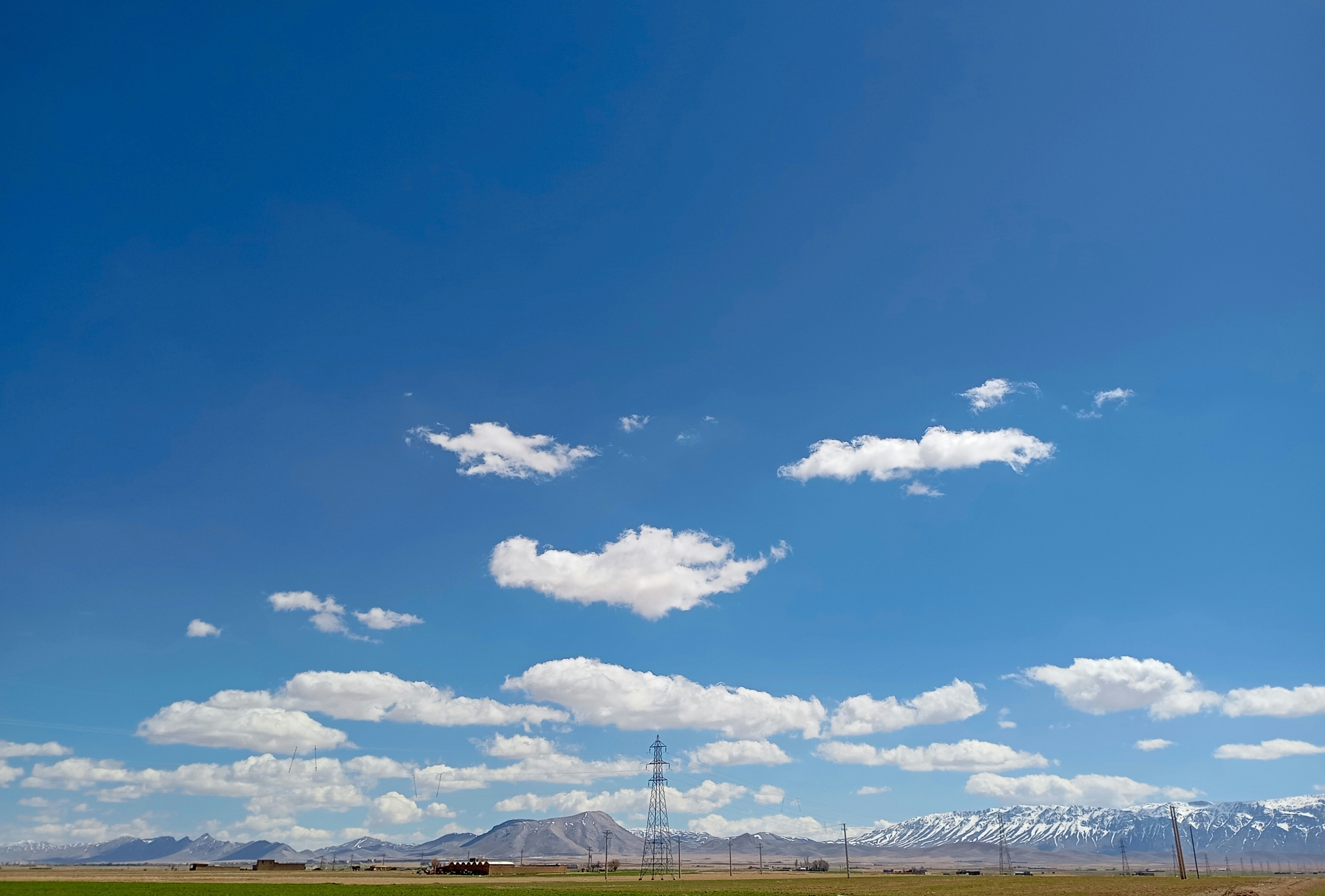 Desert Horizon Under Wide Blue Skies
