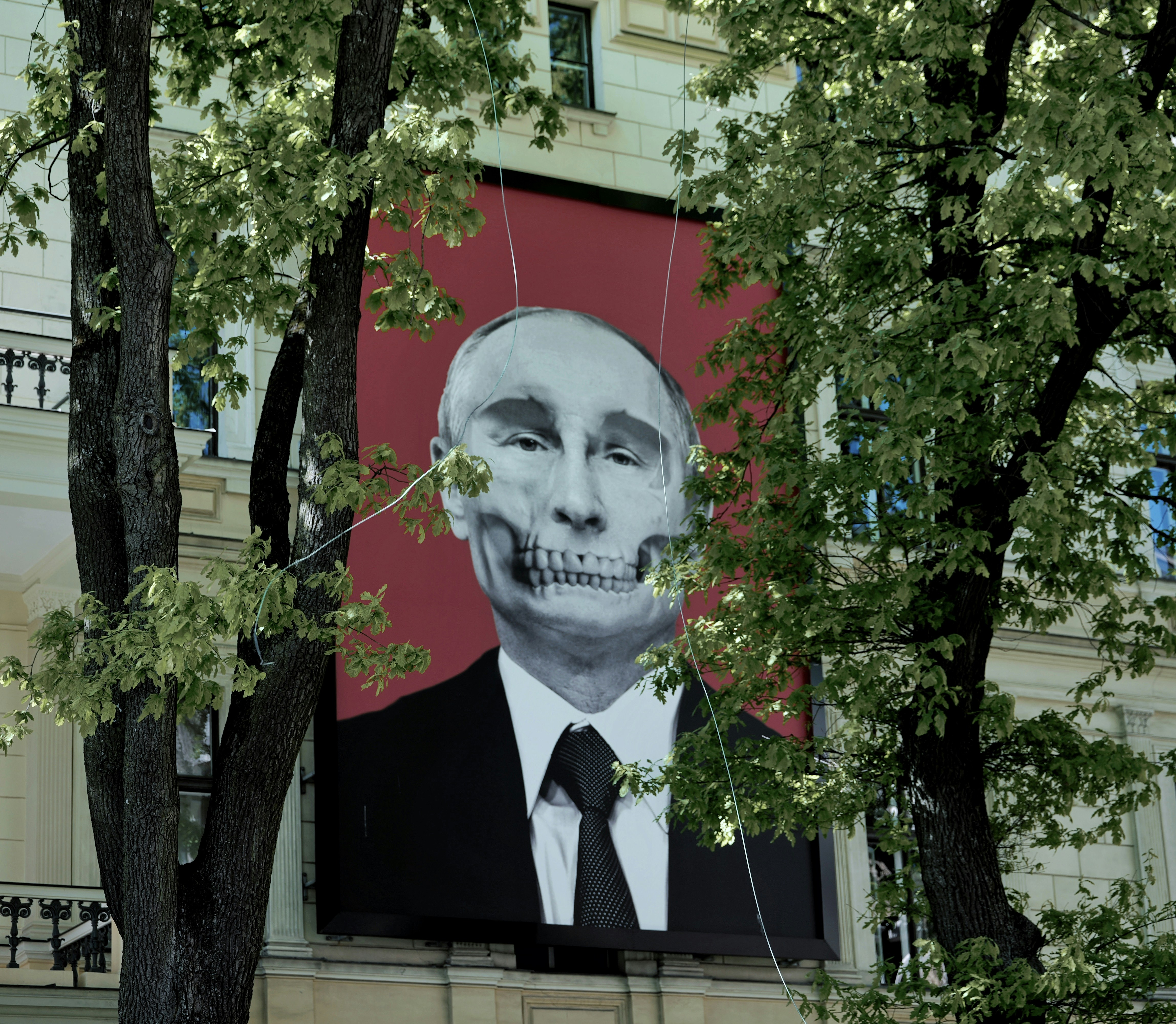 Giant Portrait of a Severed Smile Adorns a City Facade