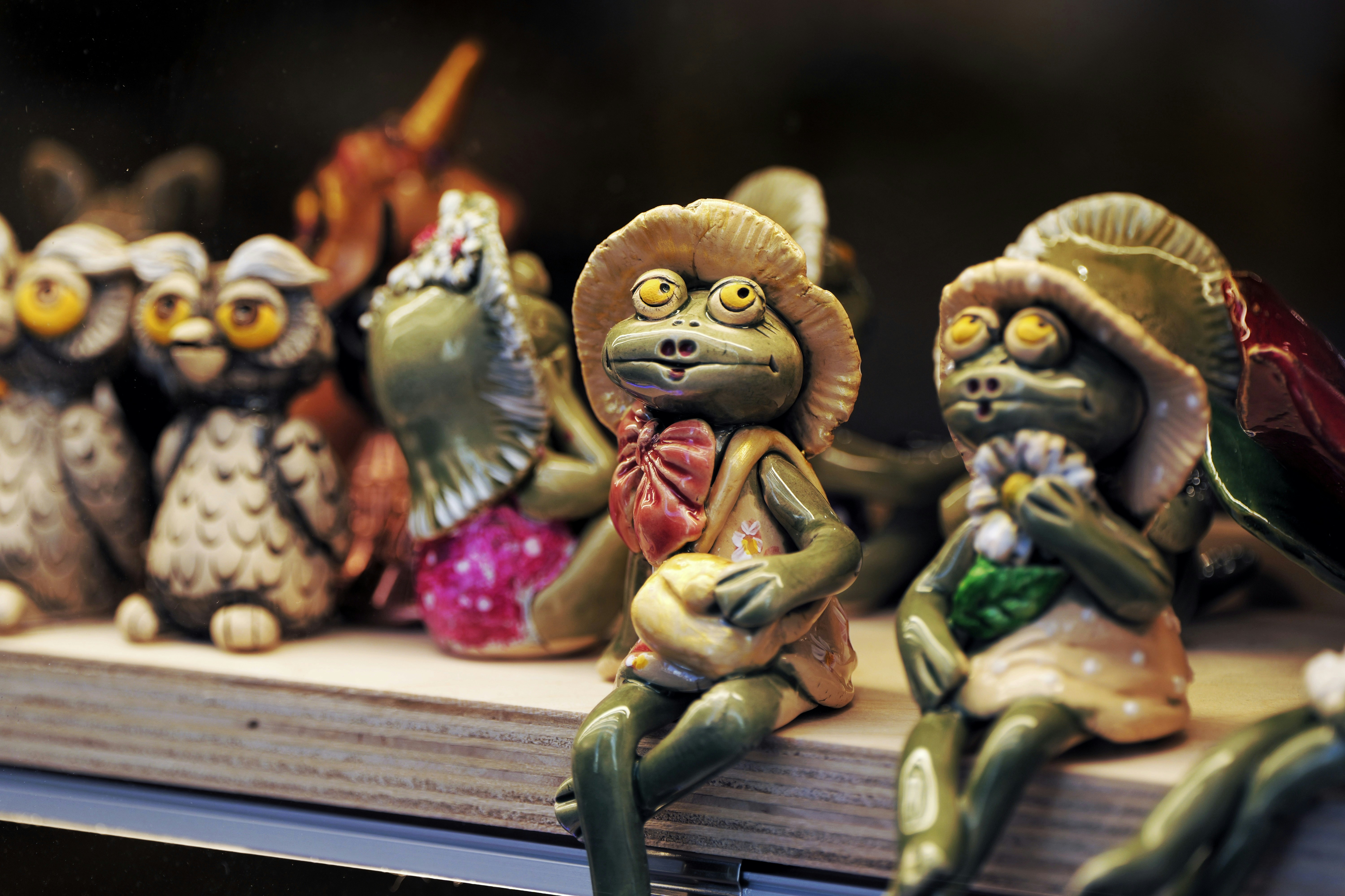 Row of Sentimental Clay Owls: A Tiny Display of Whimsy