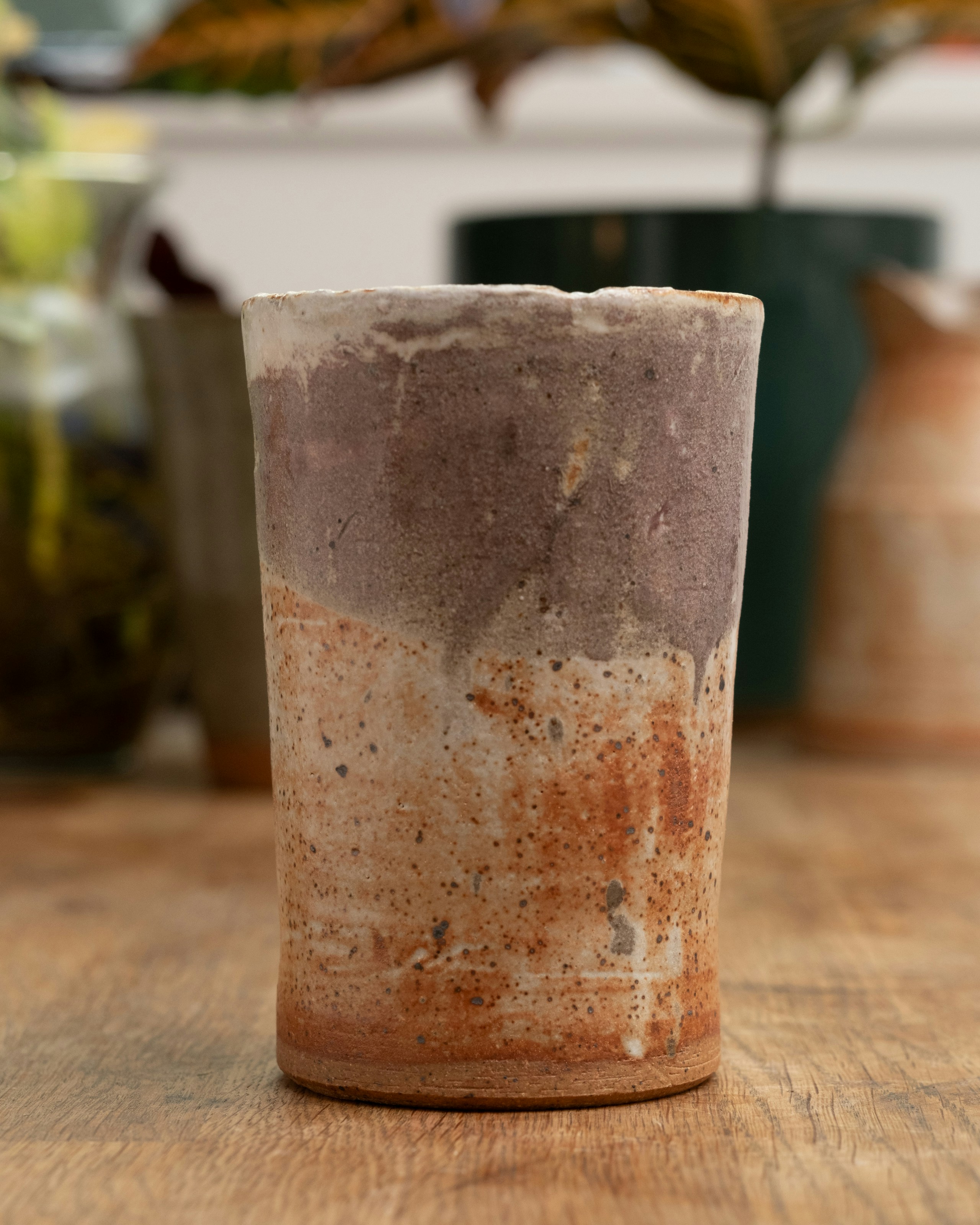 Earth-Toned Ceramic Vessel Surrounded by Soft Kitchen Studio Lighting