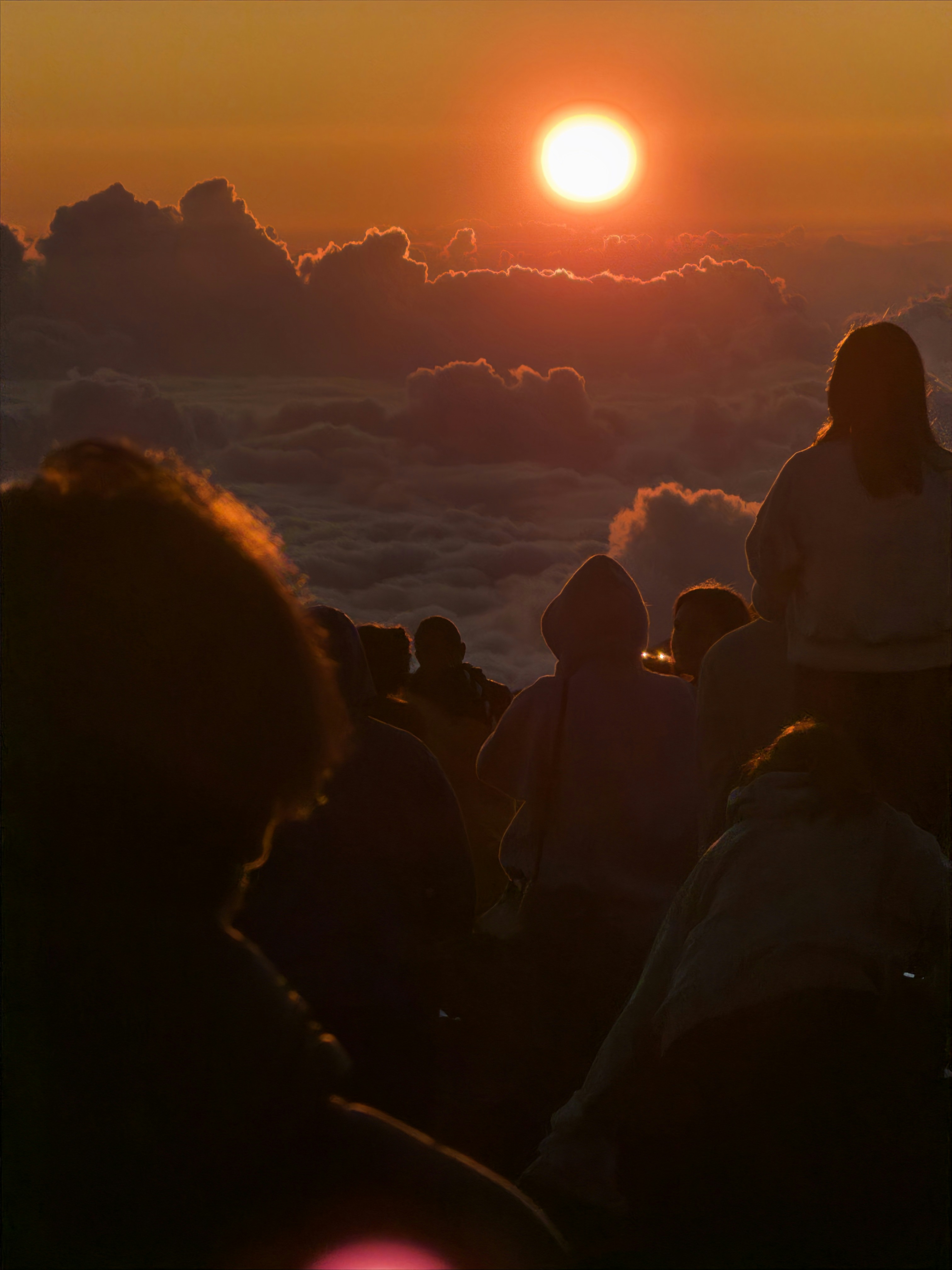 Sunrise Above the Clouds: Onlookers at the Edge of Light