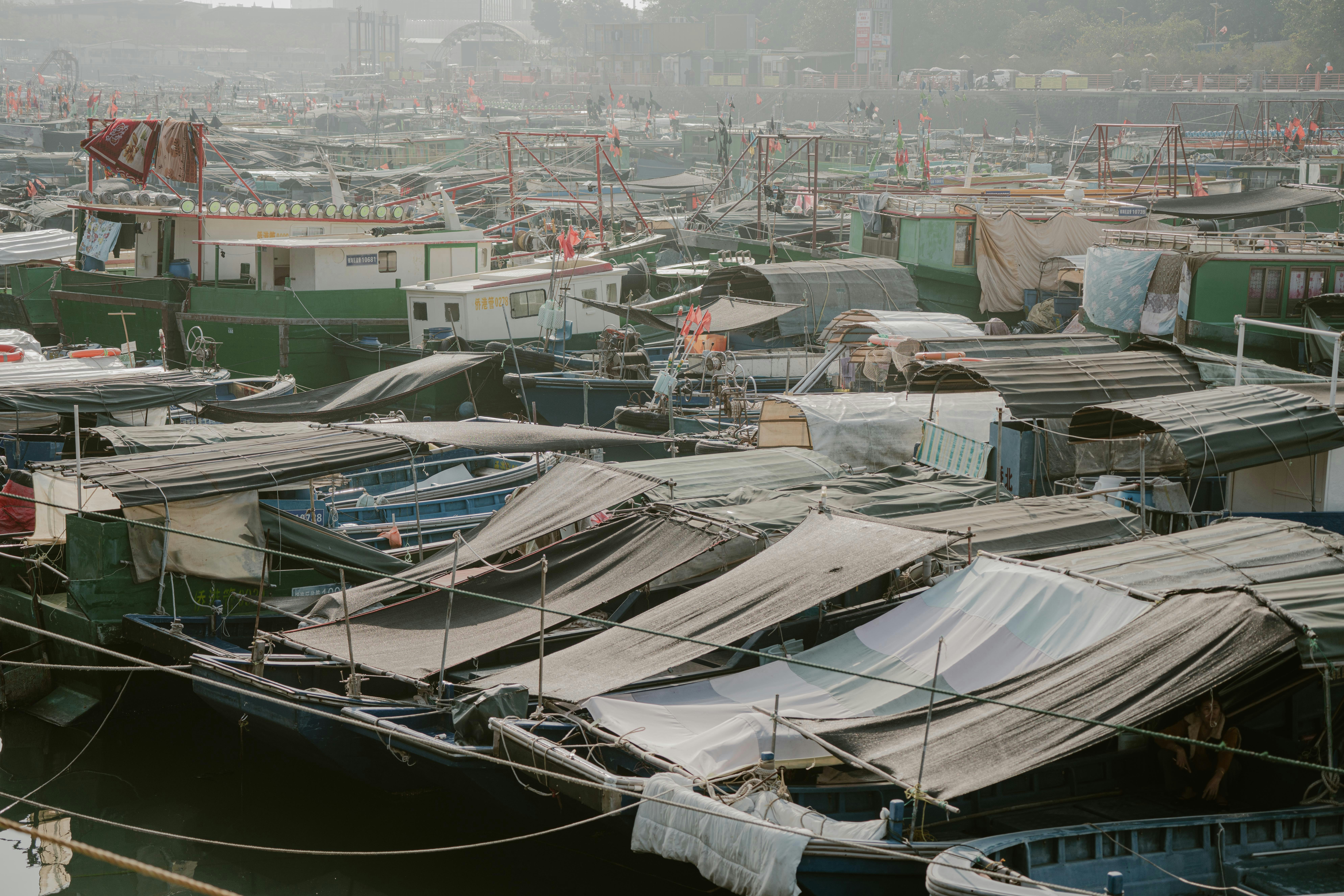 Floating Village: Boats and Canopies Bloom Across a Shaded Harbor