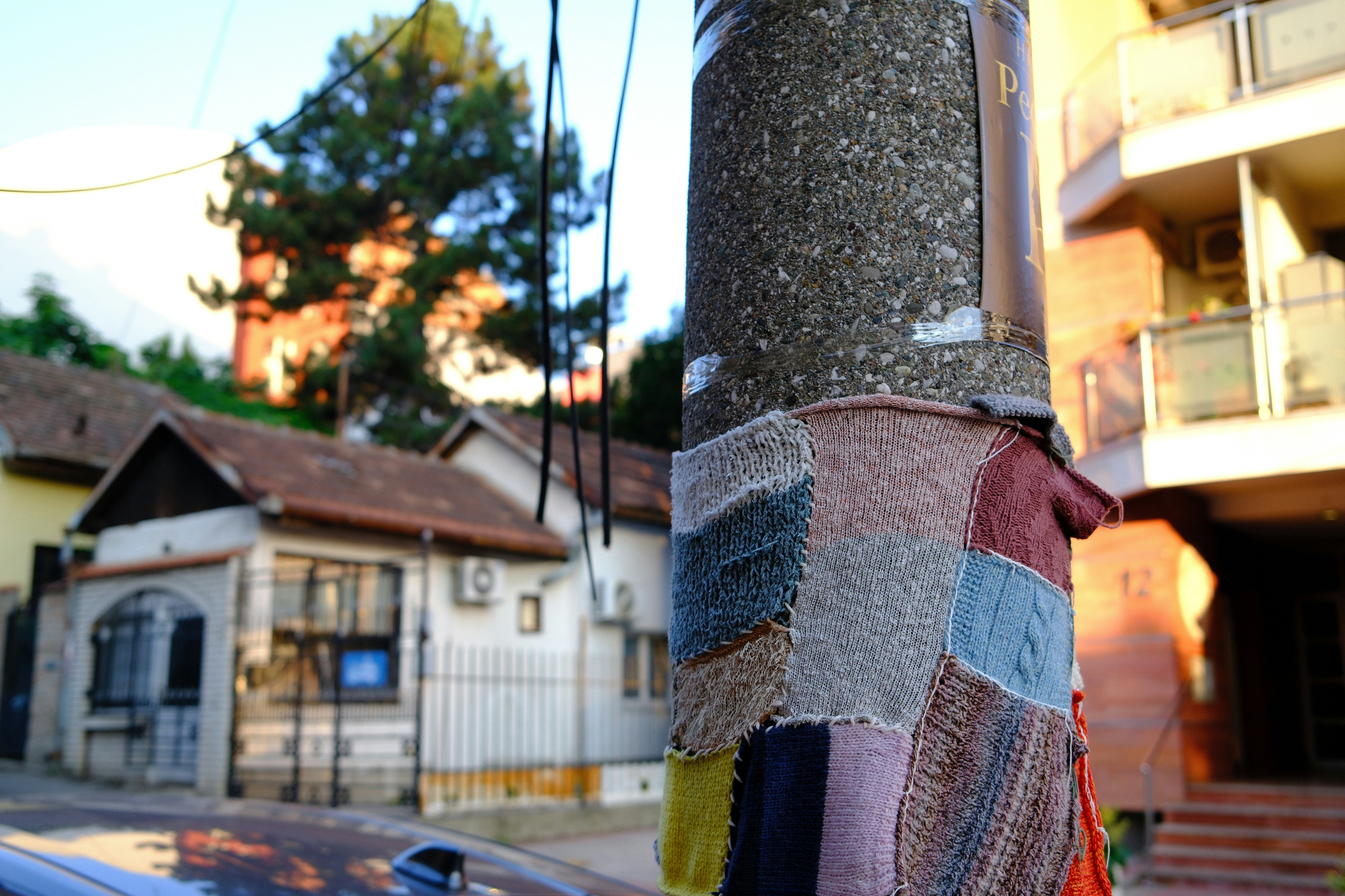 Patchwork on the Post: A Colorful Sling of Urban Texture