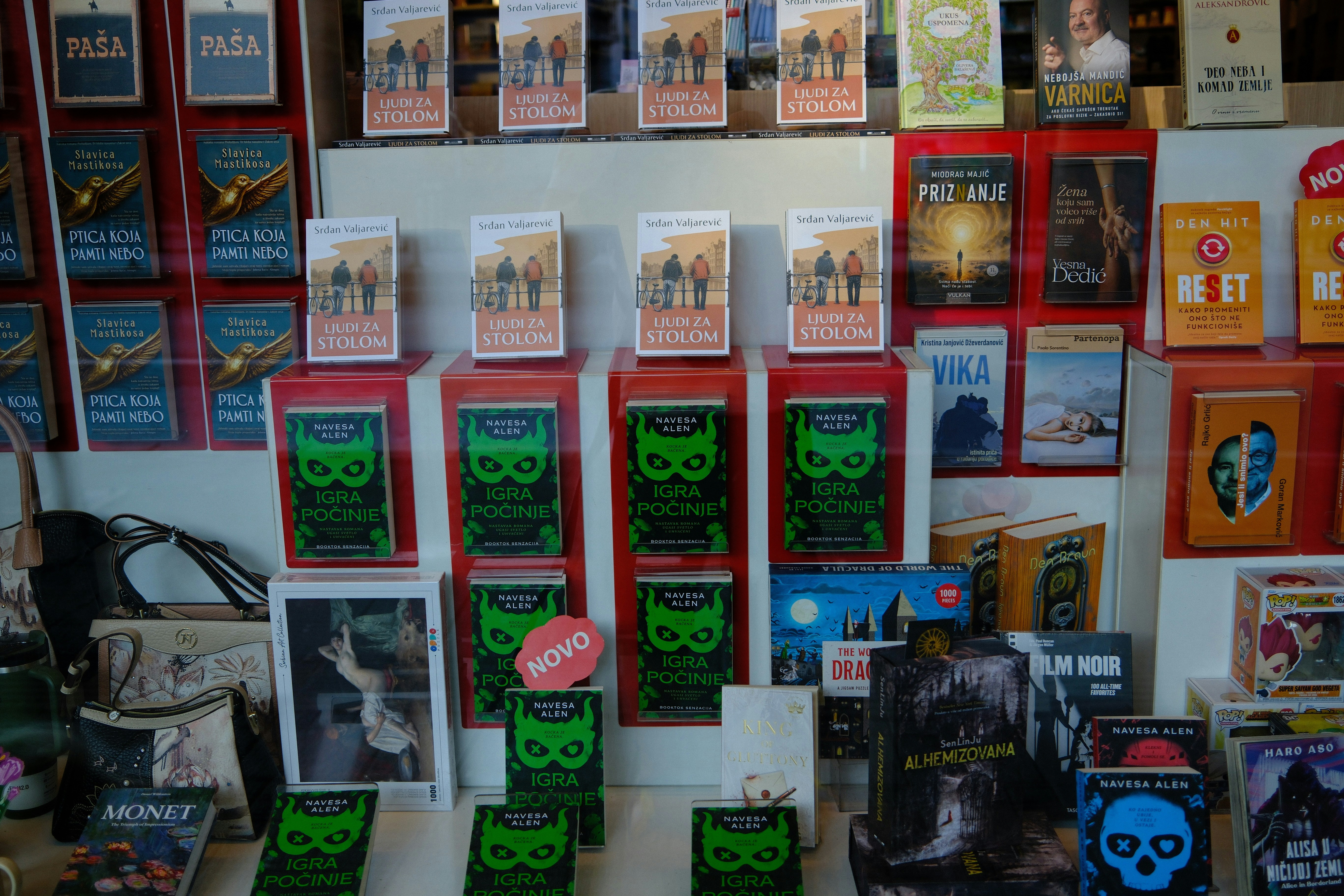 Stacked Booklets and Posters: A Colorful Market of Tales