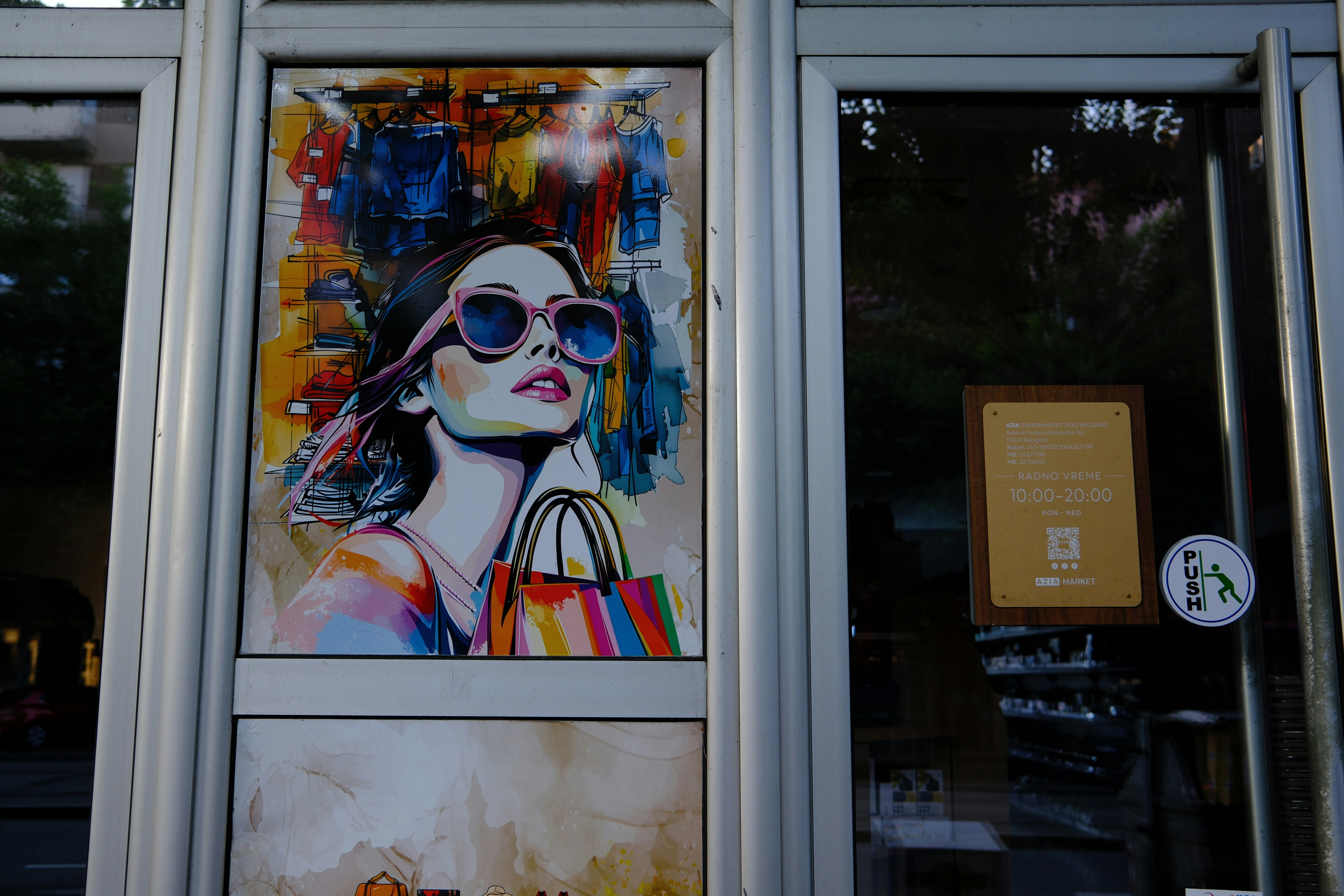 Vibrant Fashion Portrait Ad Gracing a Corner Store Window