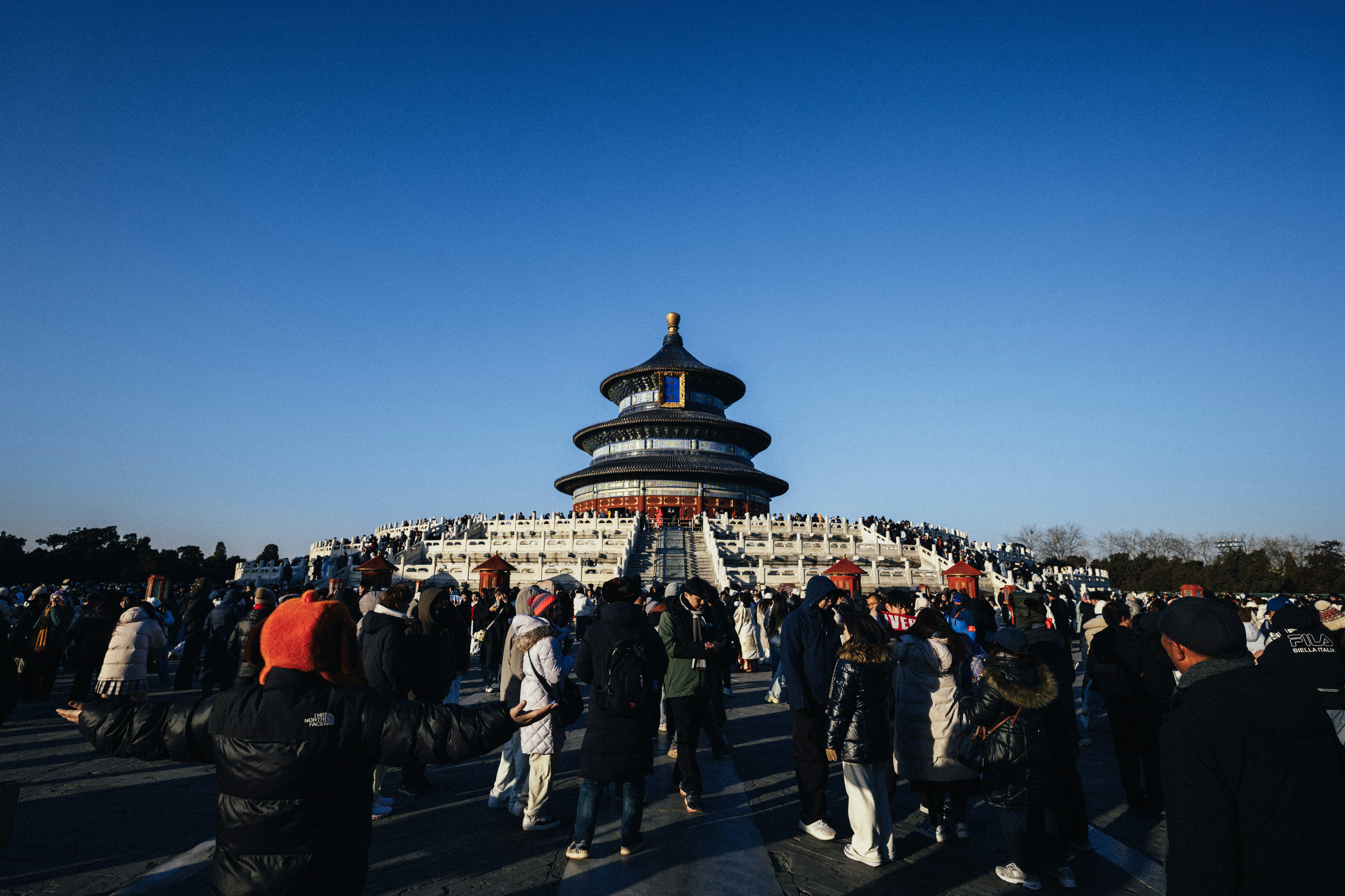Crowd at the Temple of Heaven under a Clear Winter Sky